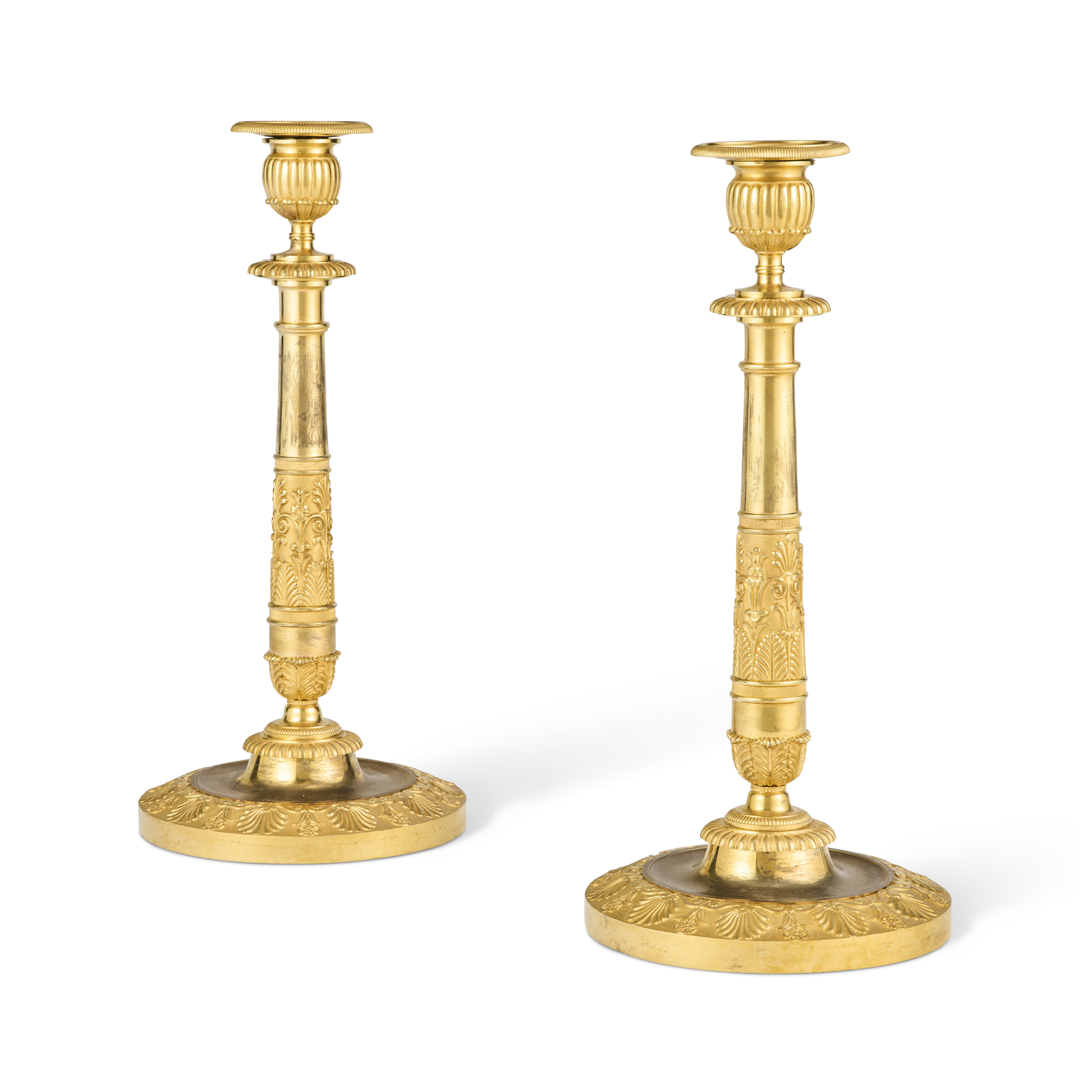 A PAIR OF RESTAURATION ORMOLU CANDLESTICKS, CIRCA 1820 | Christie’s