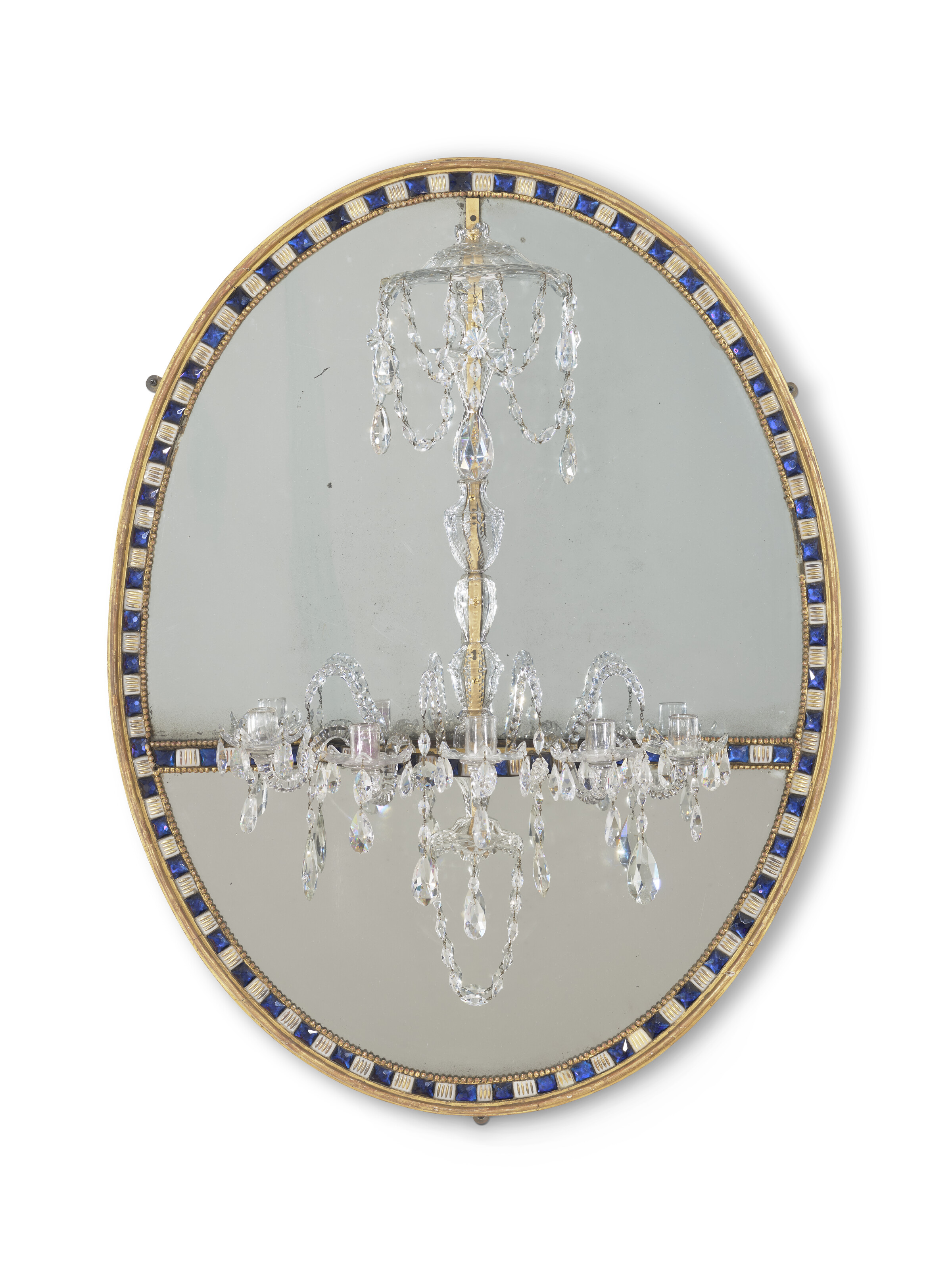 A LARGE IRISH OVAL COBALT BLUE AND COLORLESS CUT-GLASS FIVE-BRANCH ...