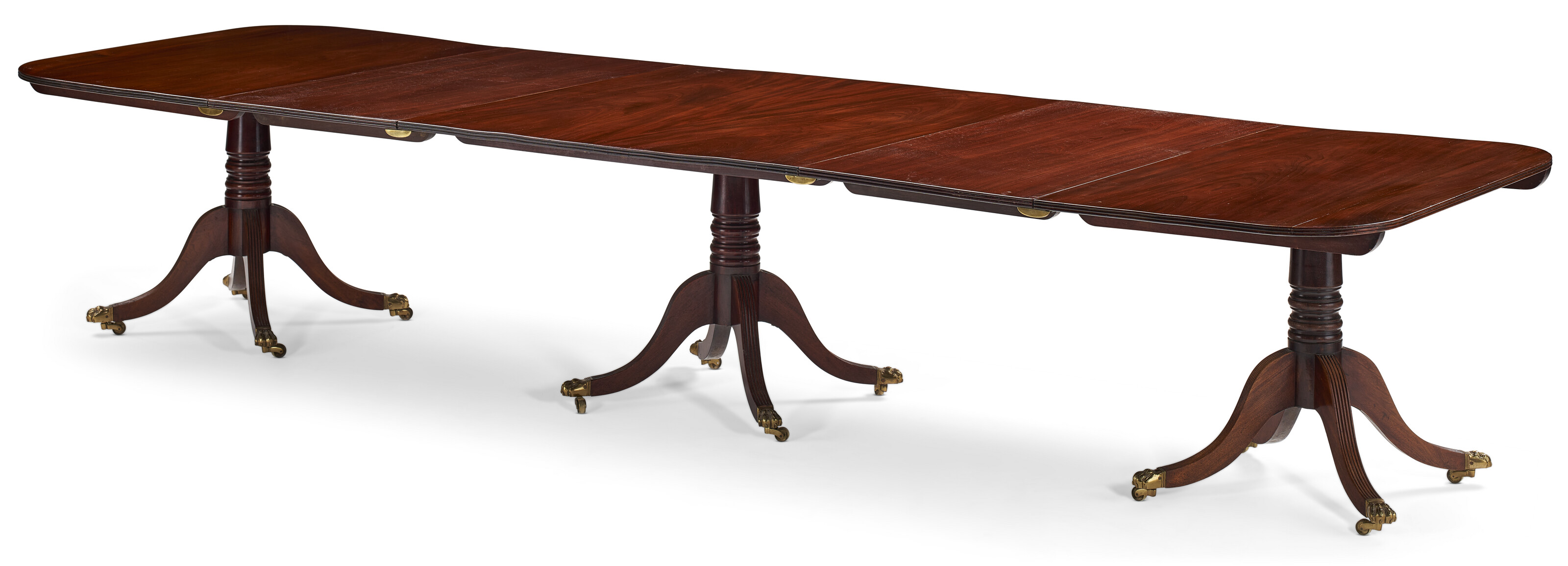 A GEORGE III MAHOGANY TRIPLE-PEDESTAL DINING TABLE, CIRCA 1800 | Christie’s