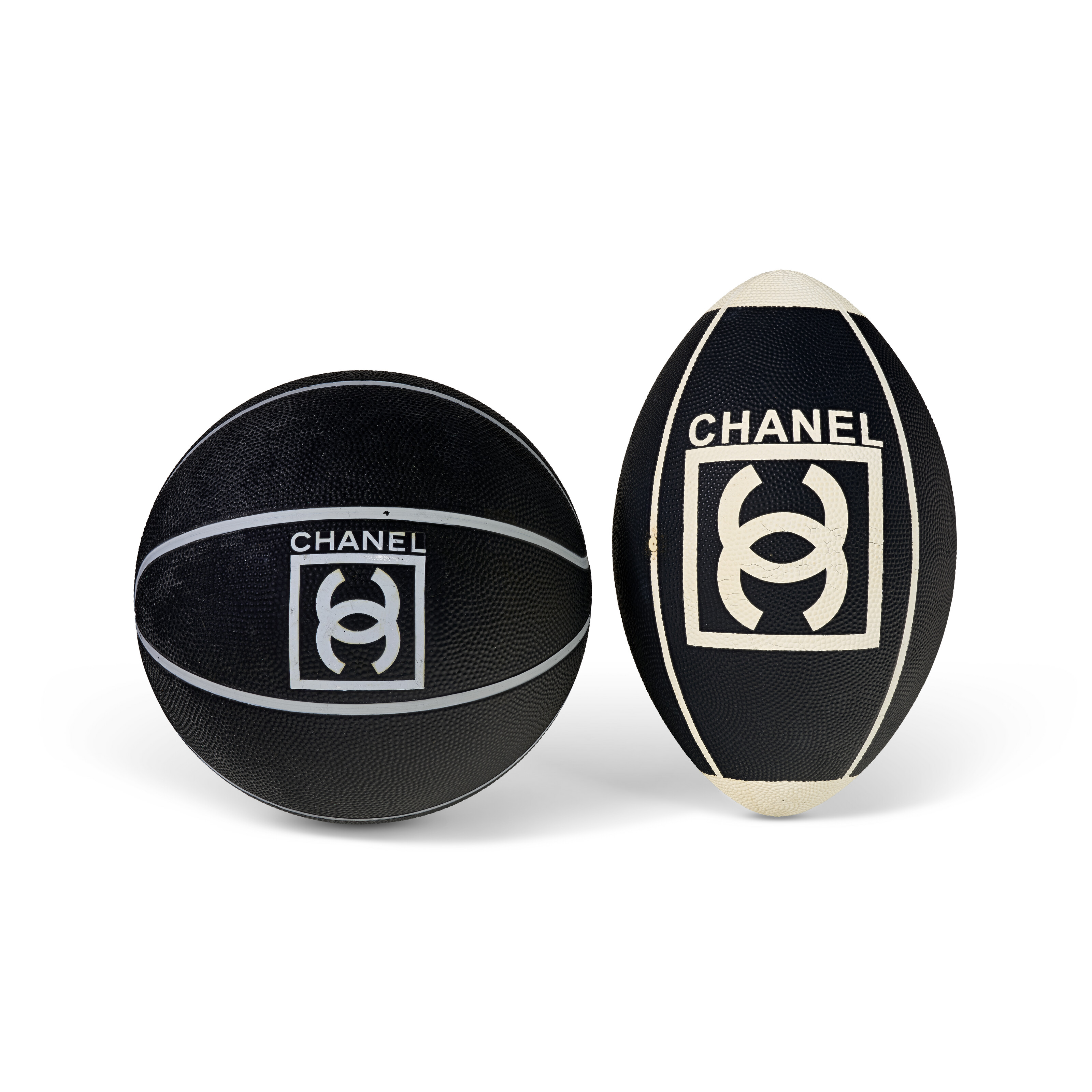 A SET OF TWO: A BLACK AND GRAY BASKETBALL & A BLACK AND CREAM RUGBY ...