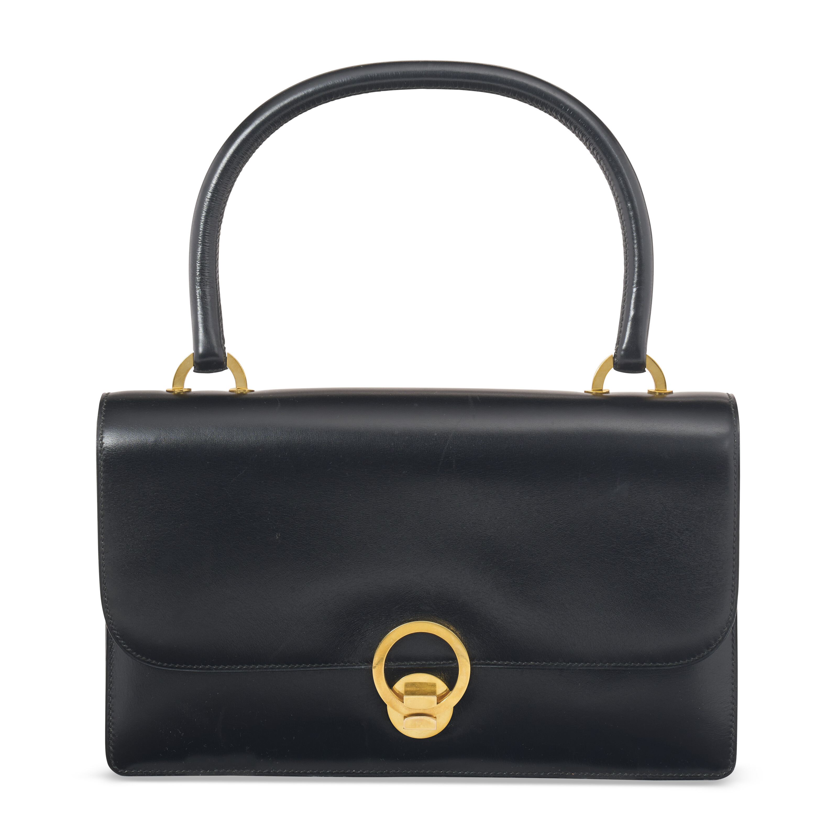 A BLACK CALF BOX LEATHER SAC RING WITH GOLD HARDWARE, HERMÈS, 1962 ...