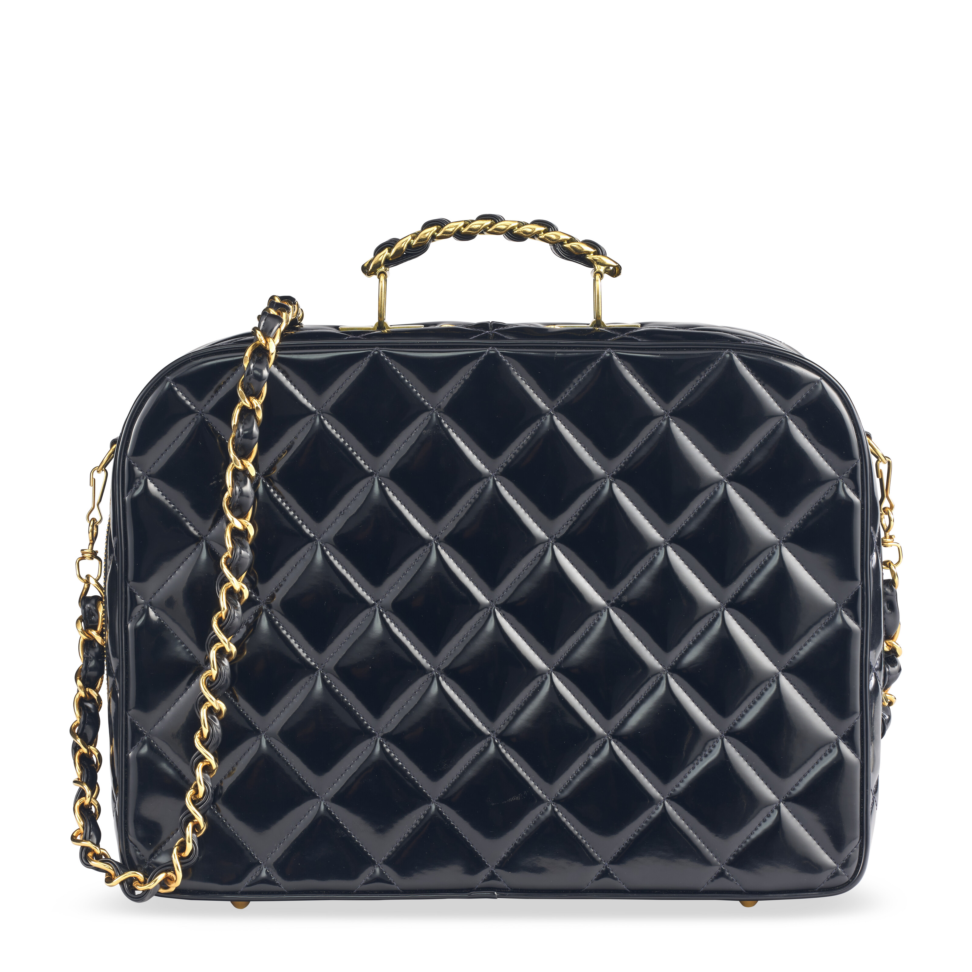 A RARE, BLACK QUILTED PATENT LEATHER LARGE VANITY CASE WITH GOLD ...