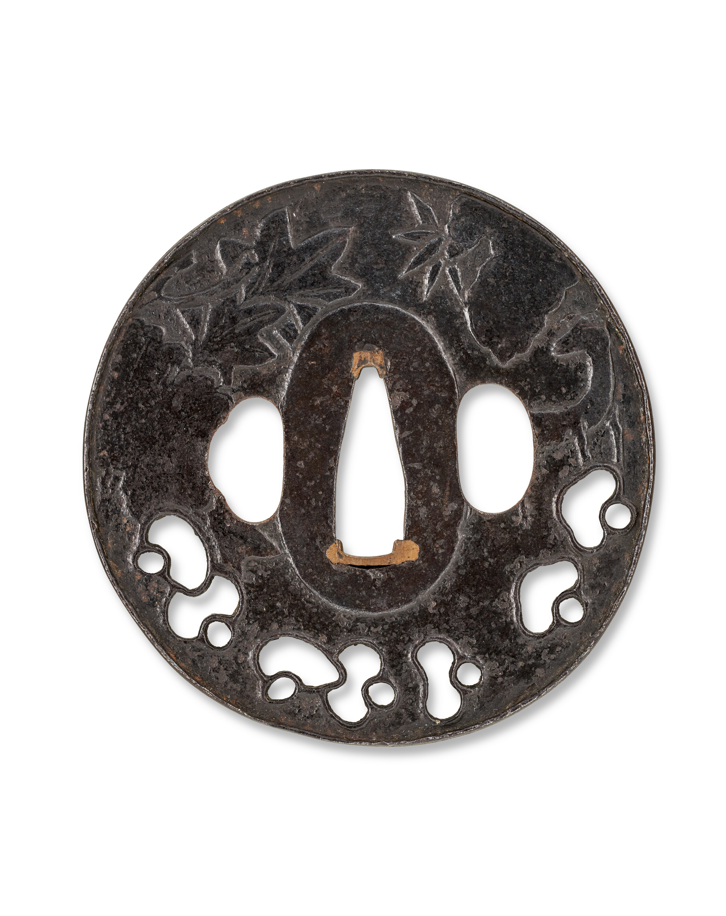 AN IRON TSUBA WITH MAPLE LEAF AND DEER, MOMOYAMA PERIOD (LATE 16TH ...