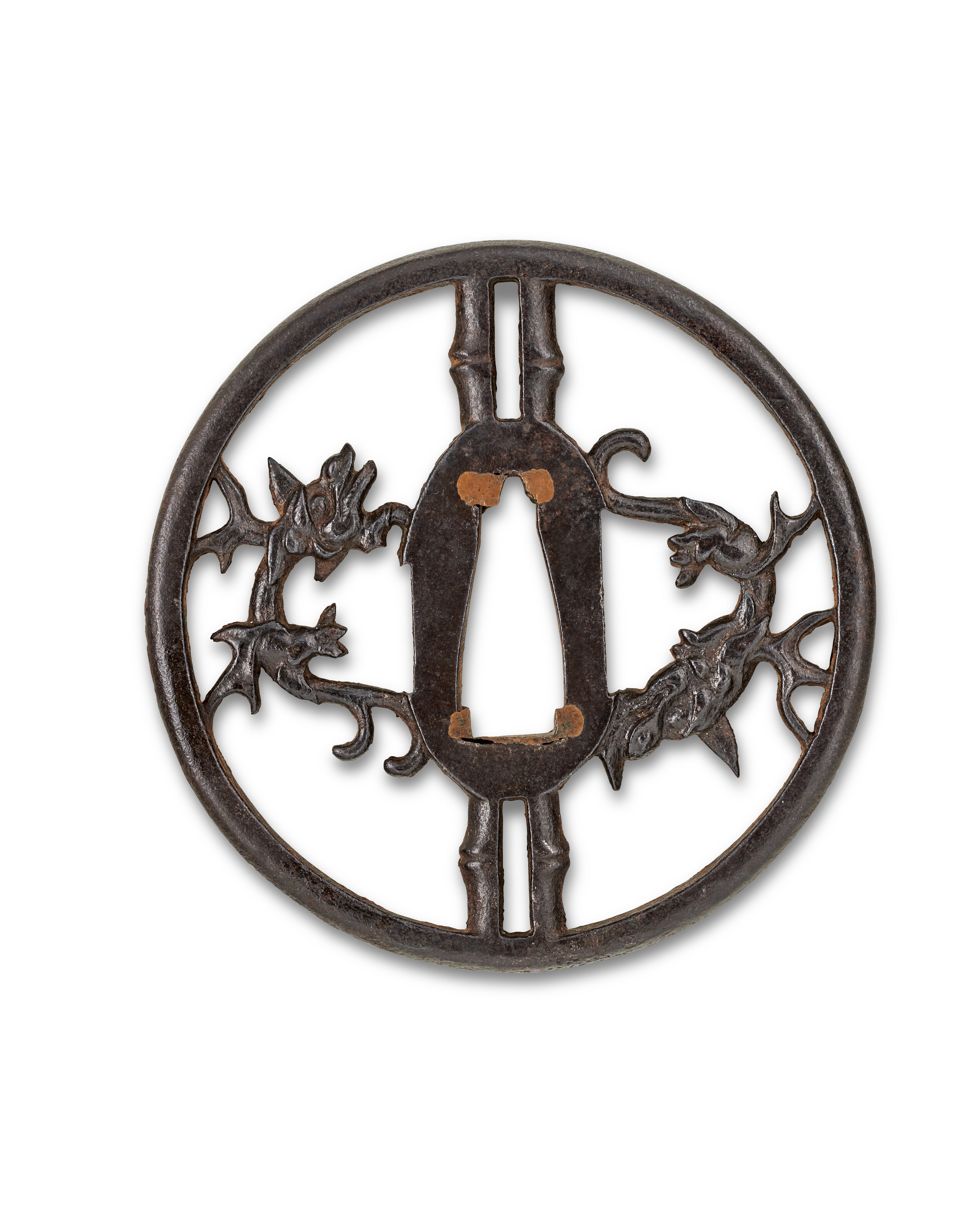 AN IRON TSUBA WITH TWO DRAGON HEADS, EDO PERIOD (18TH CENTURY) | Christie’s