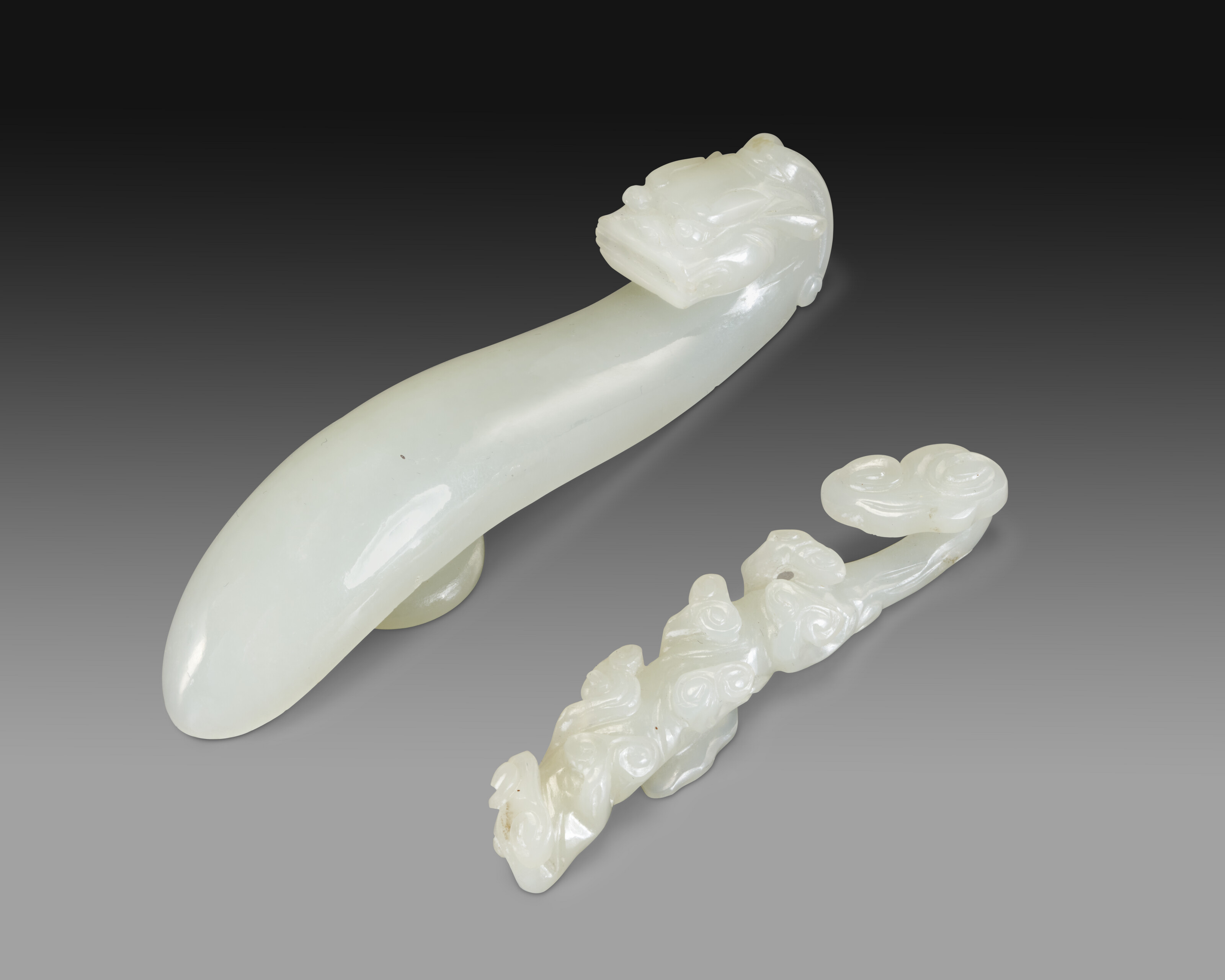TWO SMALL WHITE JADE BELT HOOKS, CHINA, 18TH-19TH CENTURY | Christie’s
