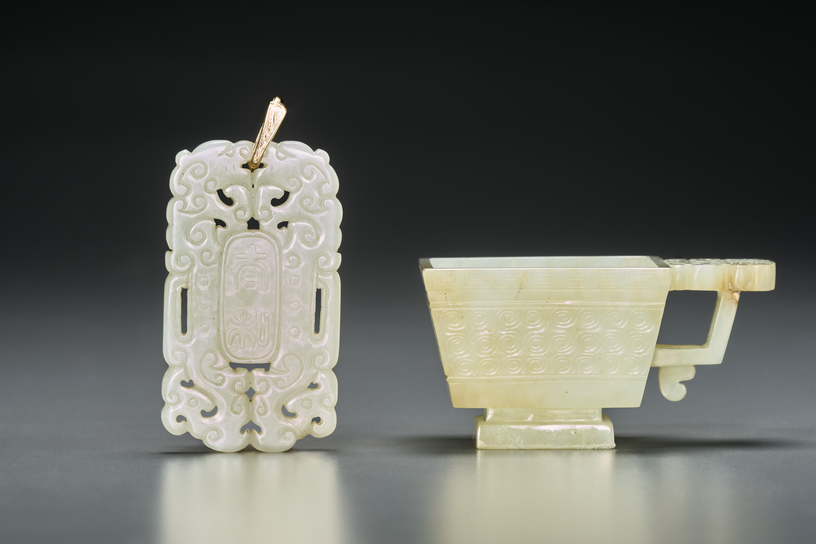 A WHITE JADE PLAQUE AND A WHITE JADE ARCHAISTIC CUP, CHINA | Christie’s