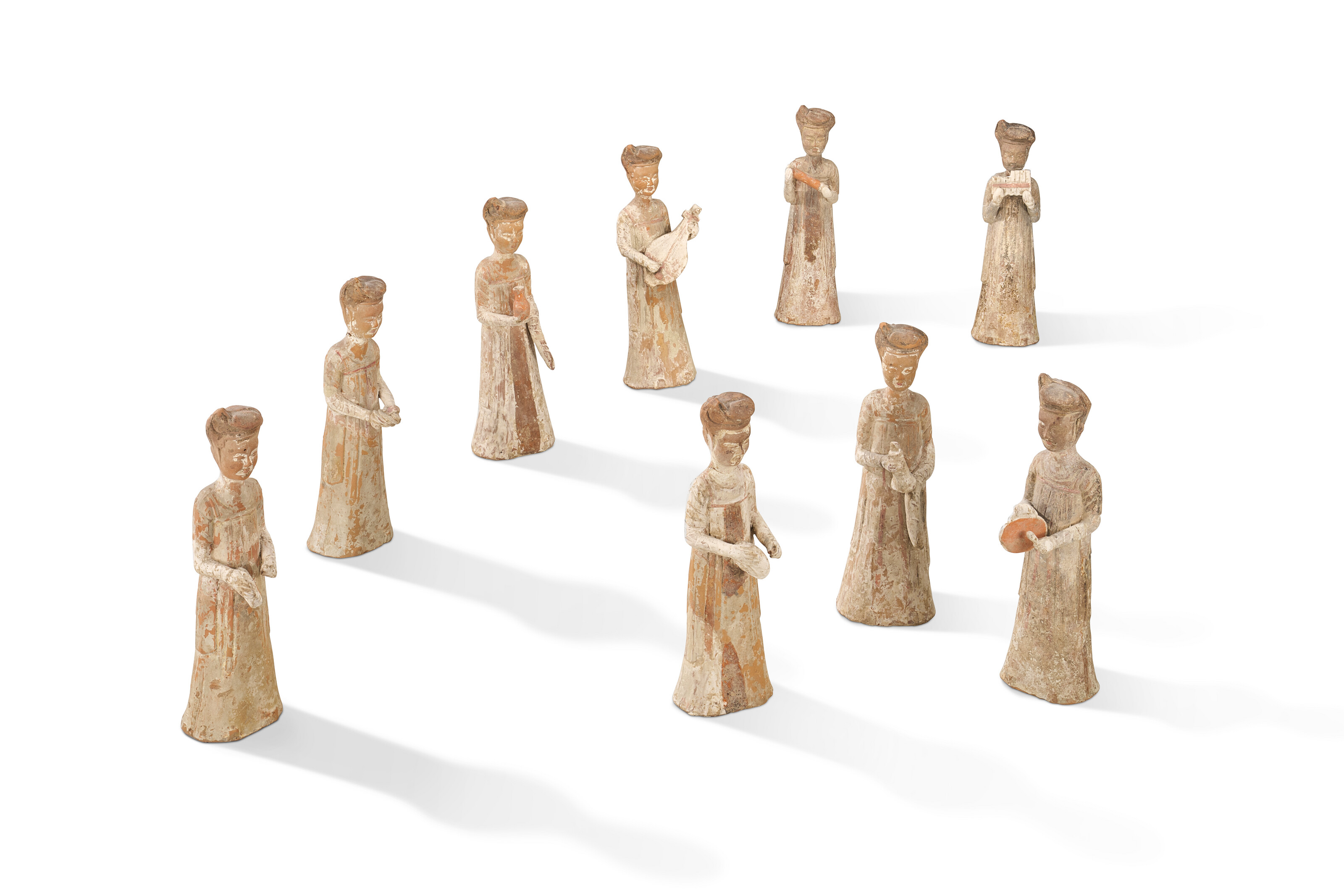 A GROUP OF NINE PAINTED POTTERY FIGURES OF FEMALE MUSICIANS, SUI-TANG ...