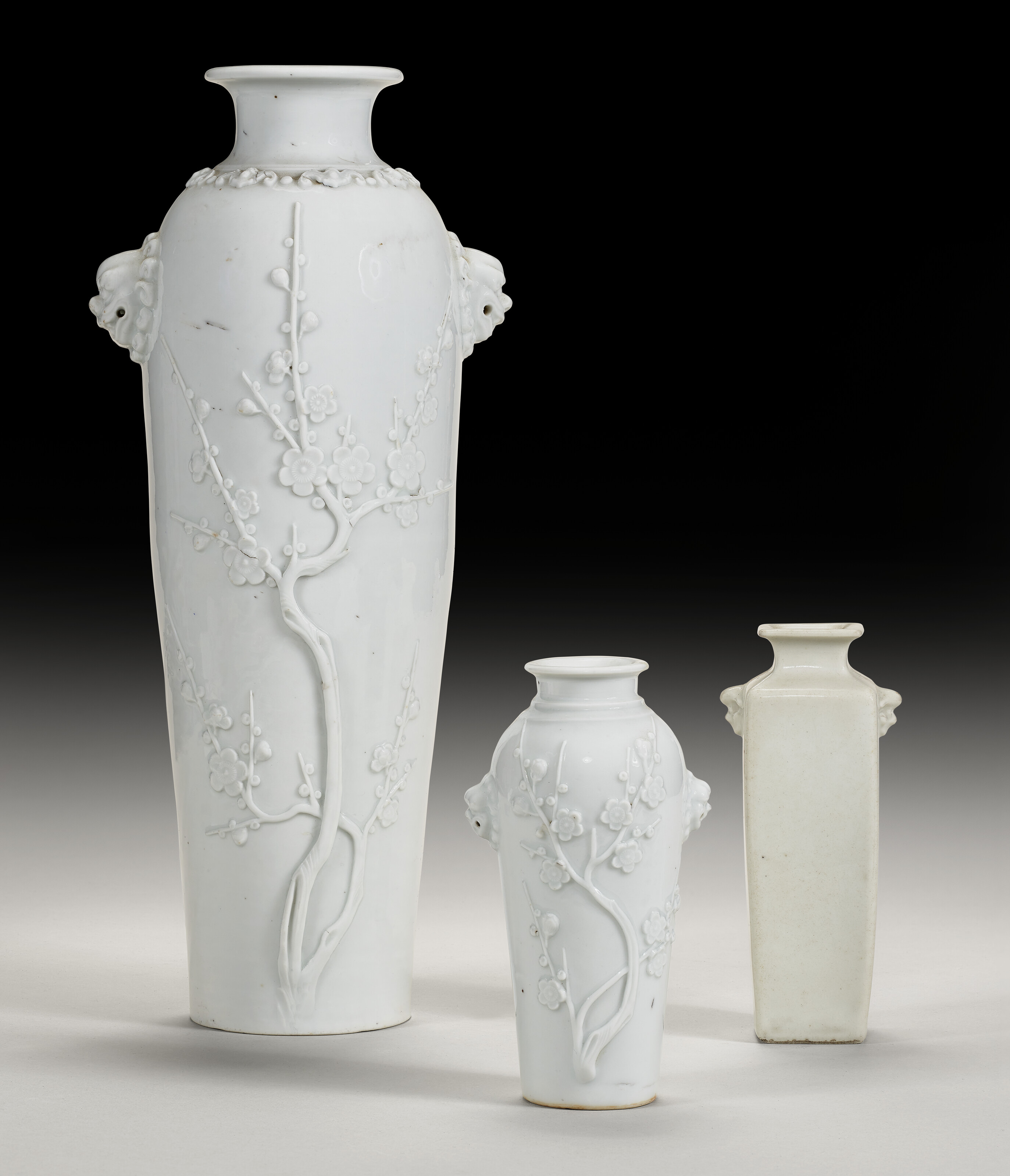 A DEHUA ‘PRUNUS’ TAPERING VASE, 17TH-18TH CENTURY | Christie’s
