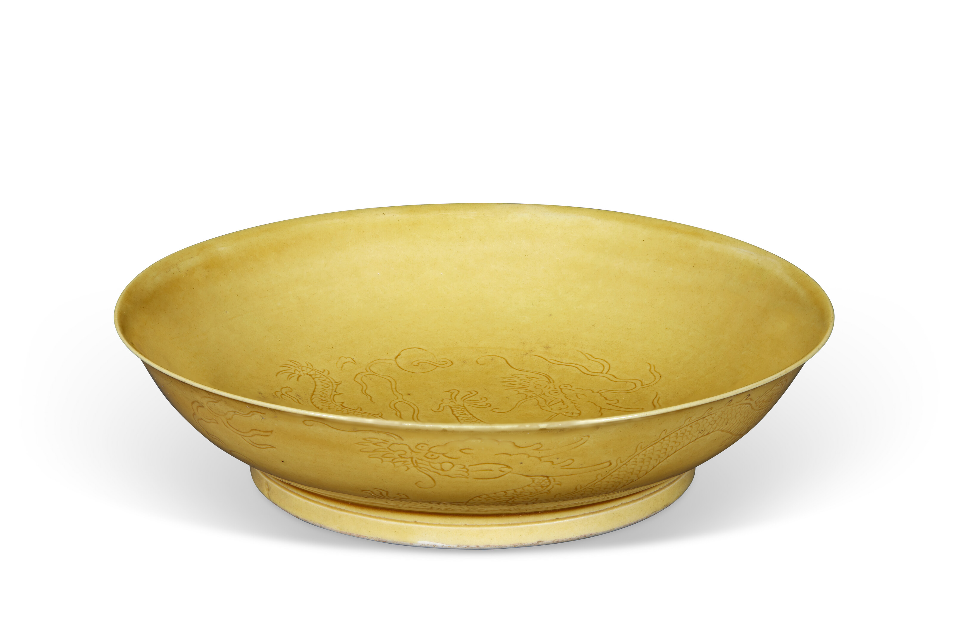 AN INCISED YELLOW-GLAZED 'DRAGON' DISH, | Christie’s