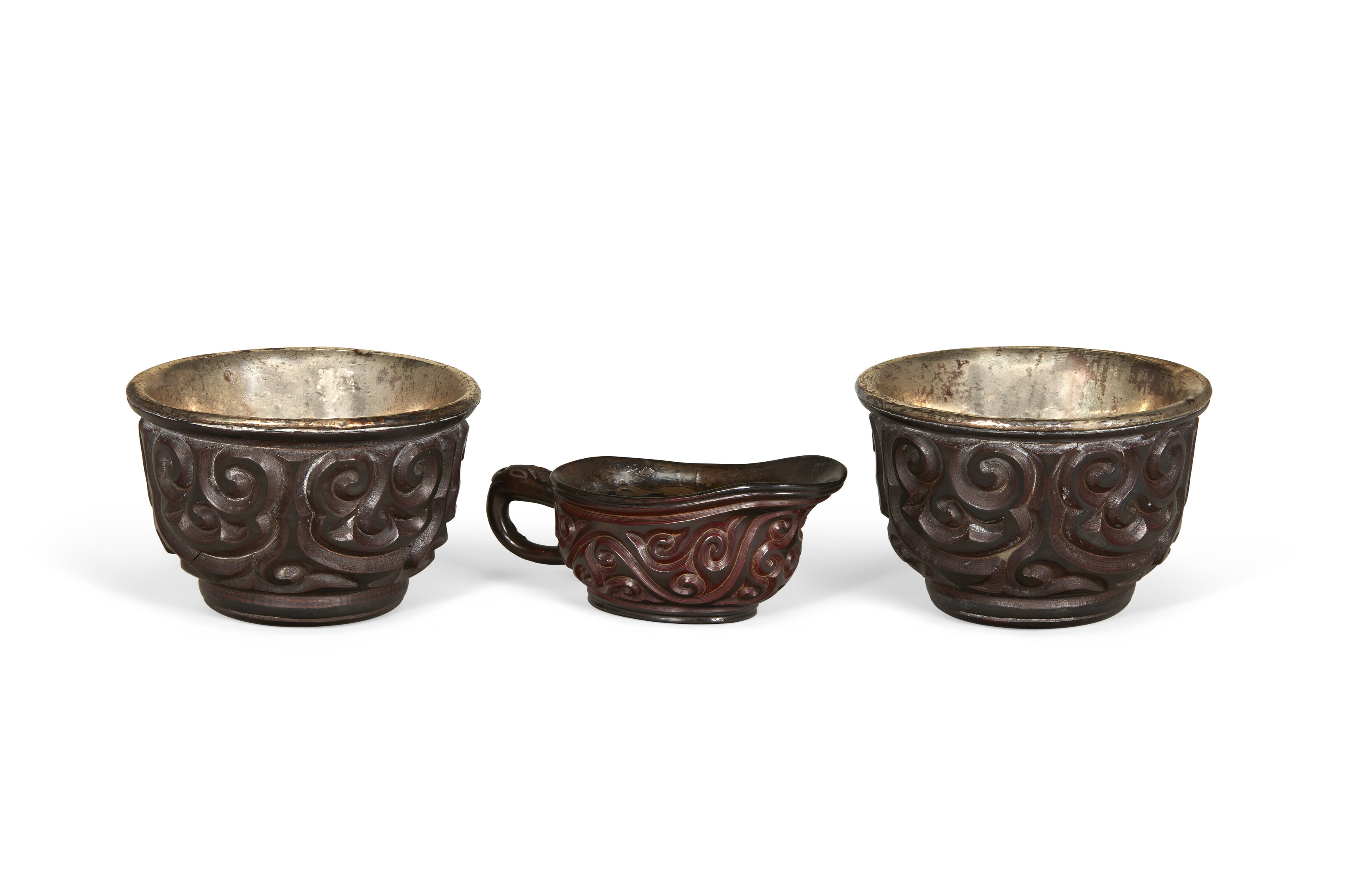 A PAIR OF SILVER-LINED TIXI LACQUER CUPS AND A TIXI LACQUER POURING ...