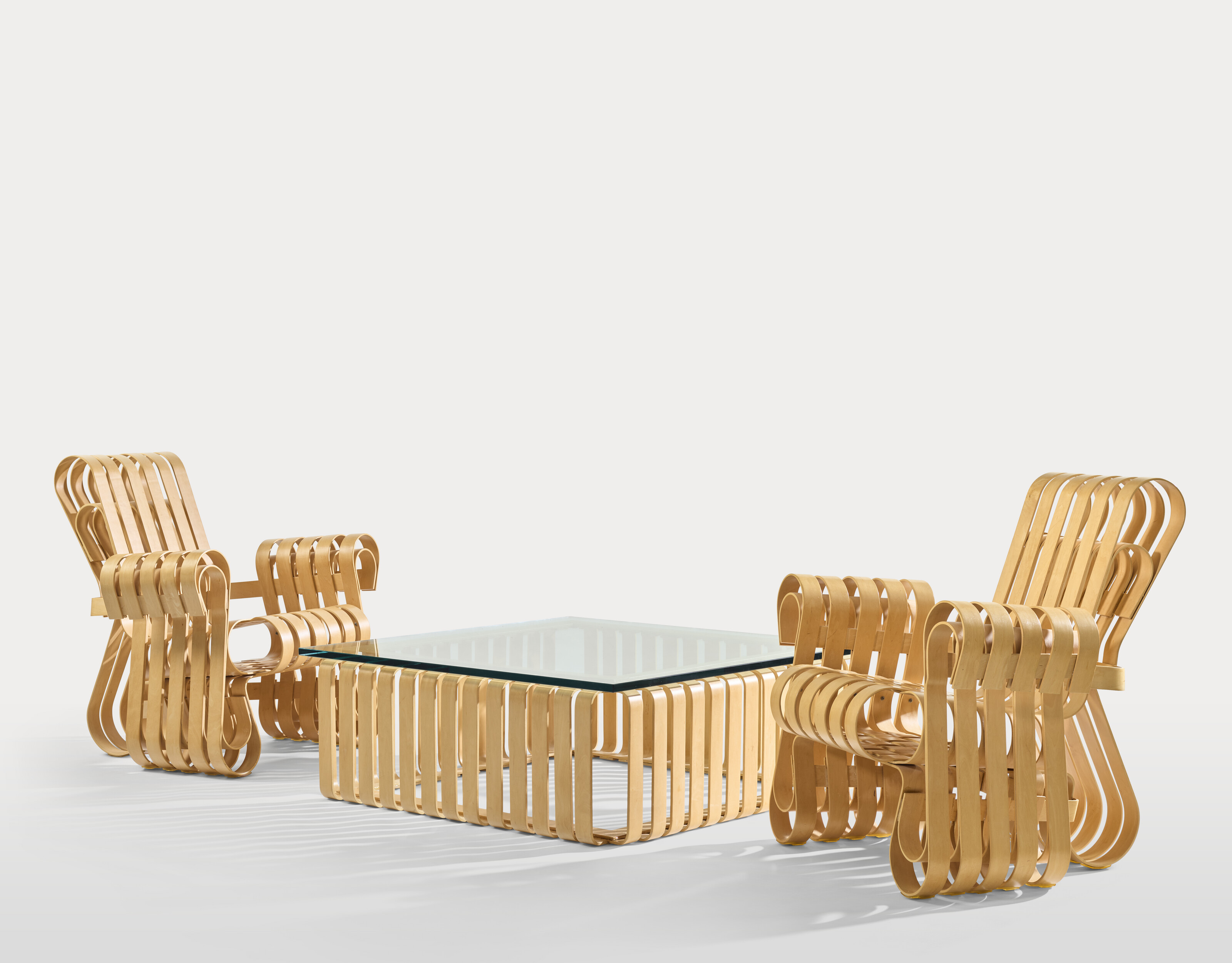 FRANK GEHRY (B. 1929), Pair of 'Power Play' Armchairs and ‘Icing ...