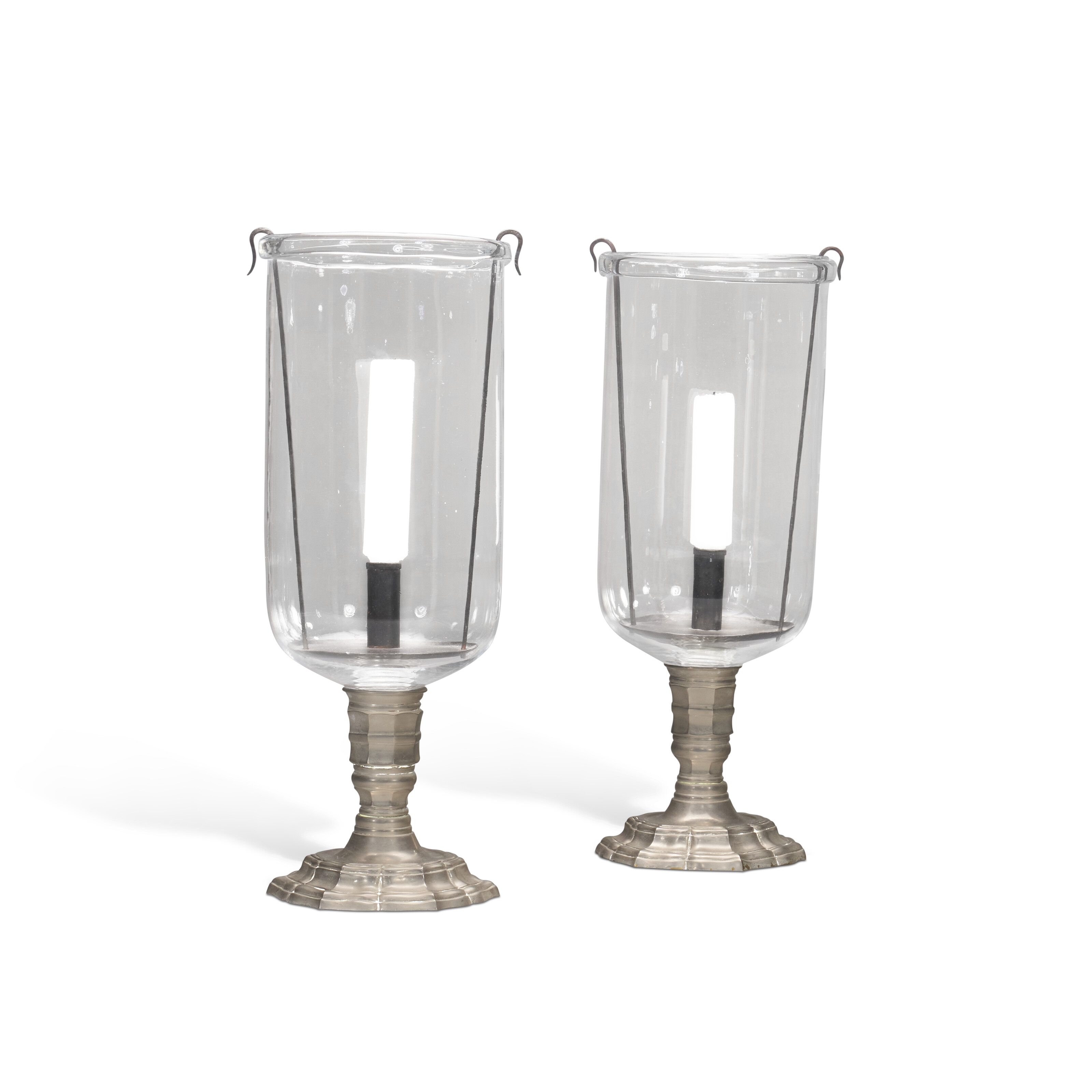 A PAIR OF WHITE AND PATINATED METAL PHOTOPHORES, 20TH CENTURY | Christie’s