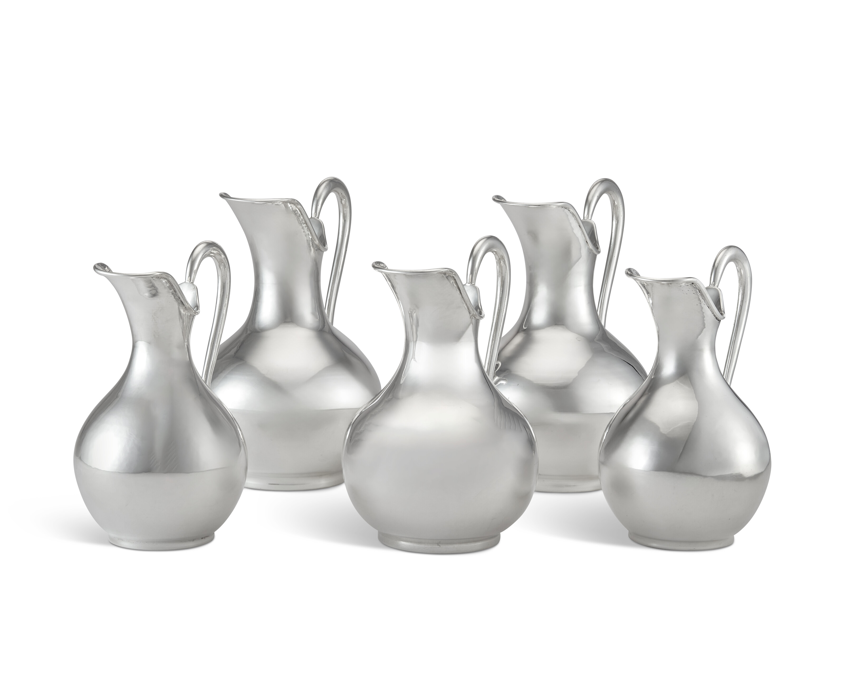 A SUITE OF FIVE SILVER PITCHERS, LATE 20TH CENTURY | Christie’s