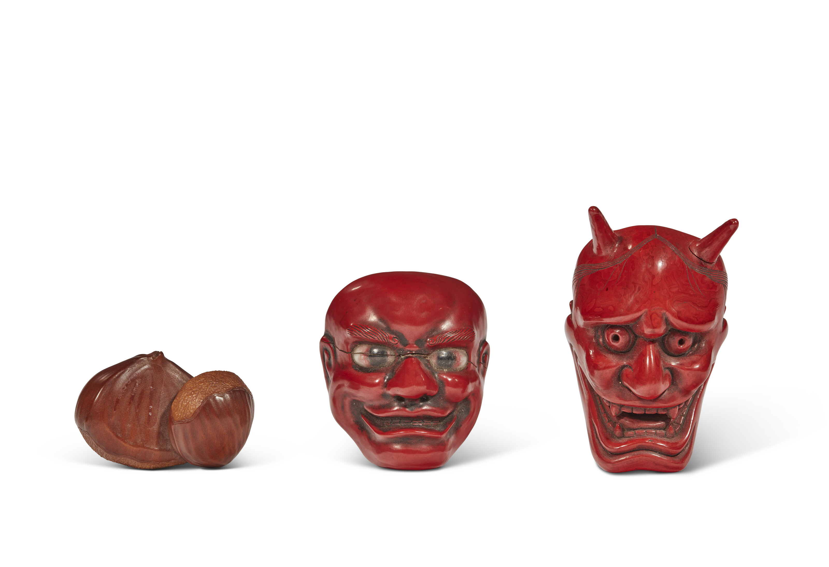 A GROUP OF TWO RED-LACQUER NETSUKE AND A BOXWOOD NETSUKE, JAPAN, MEIJI ...