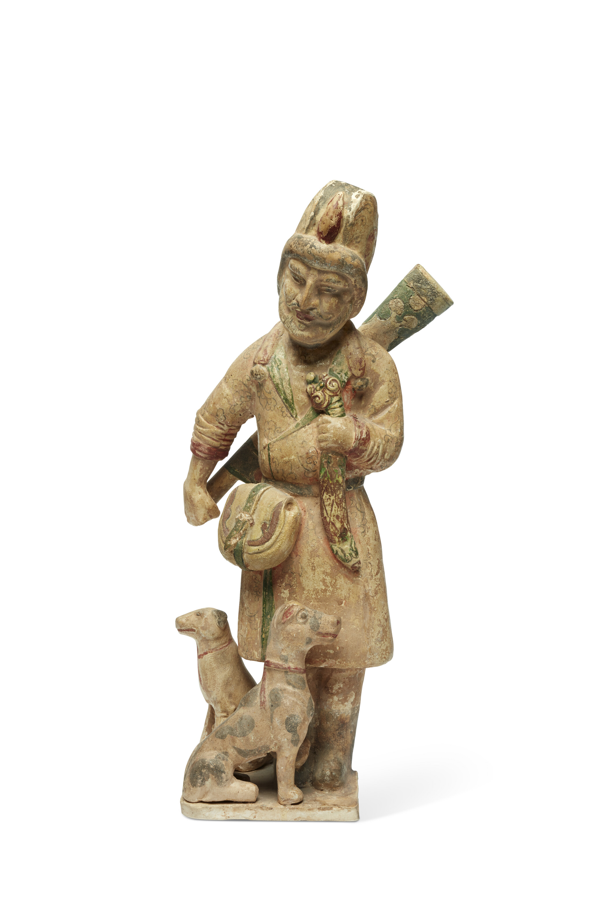 A PARCEL-GLAZED POLYCHROME POTTERY FIGURE OF A HUNTER WITH DOGS, CHINA ...