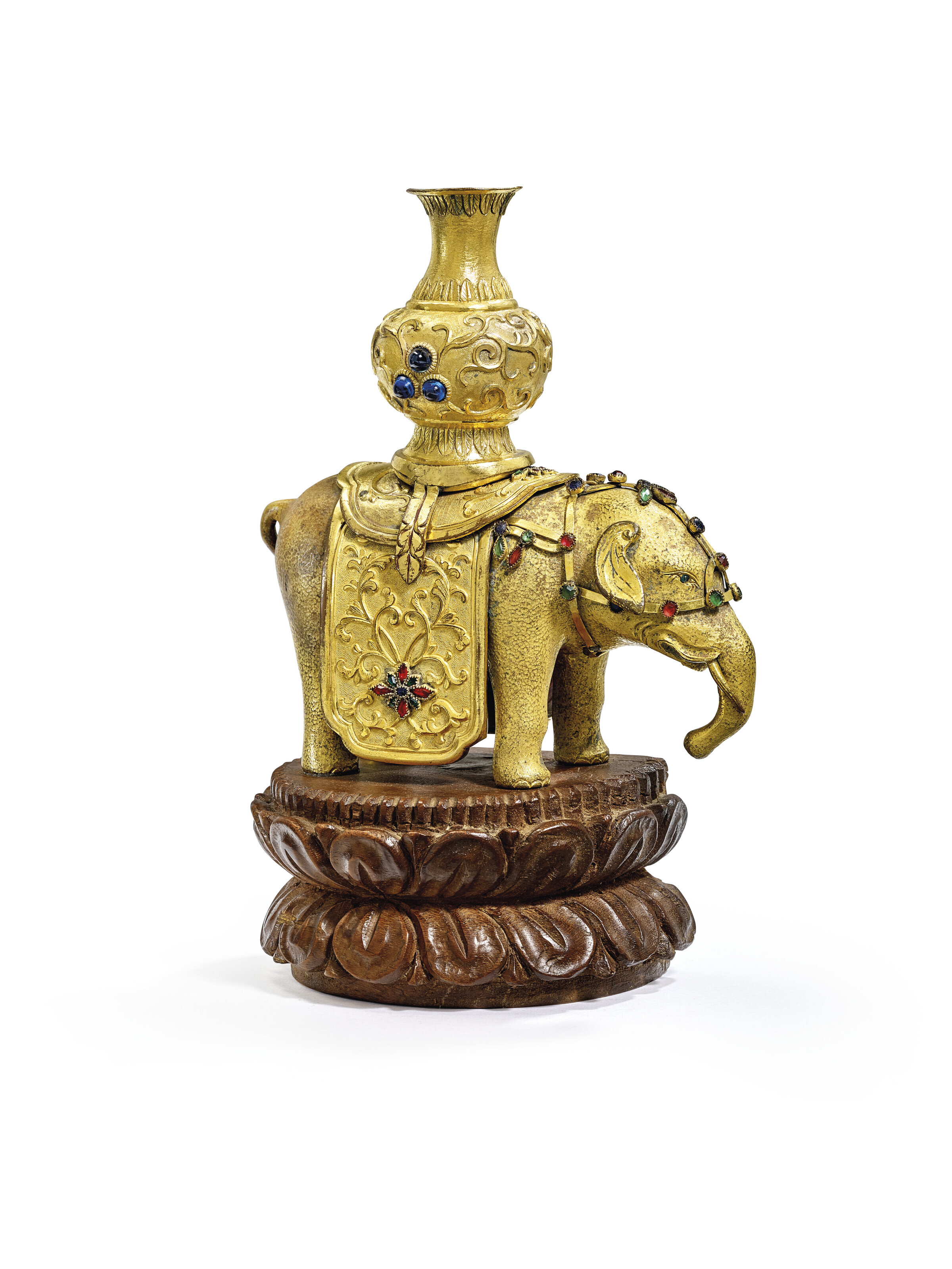 A GLASS-INLAID GILT-BRONZE ELEPHANT, CHINA, QING DYNASTY, QIANLONG ...