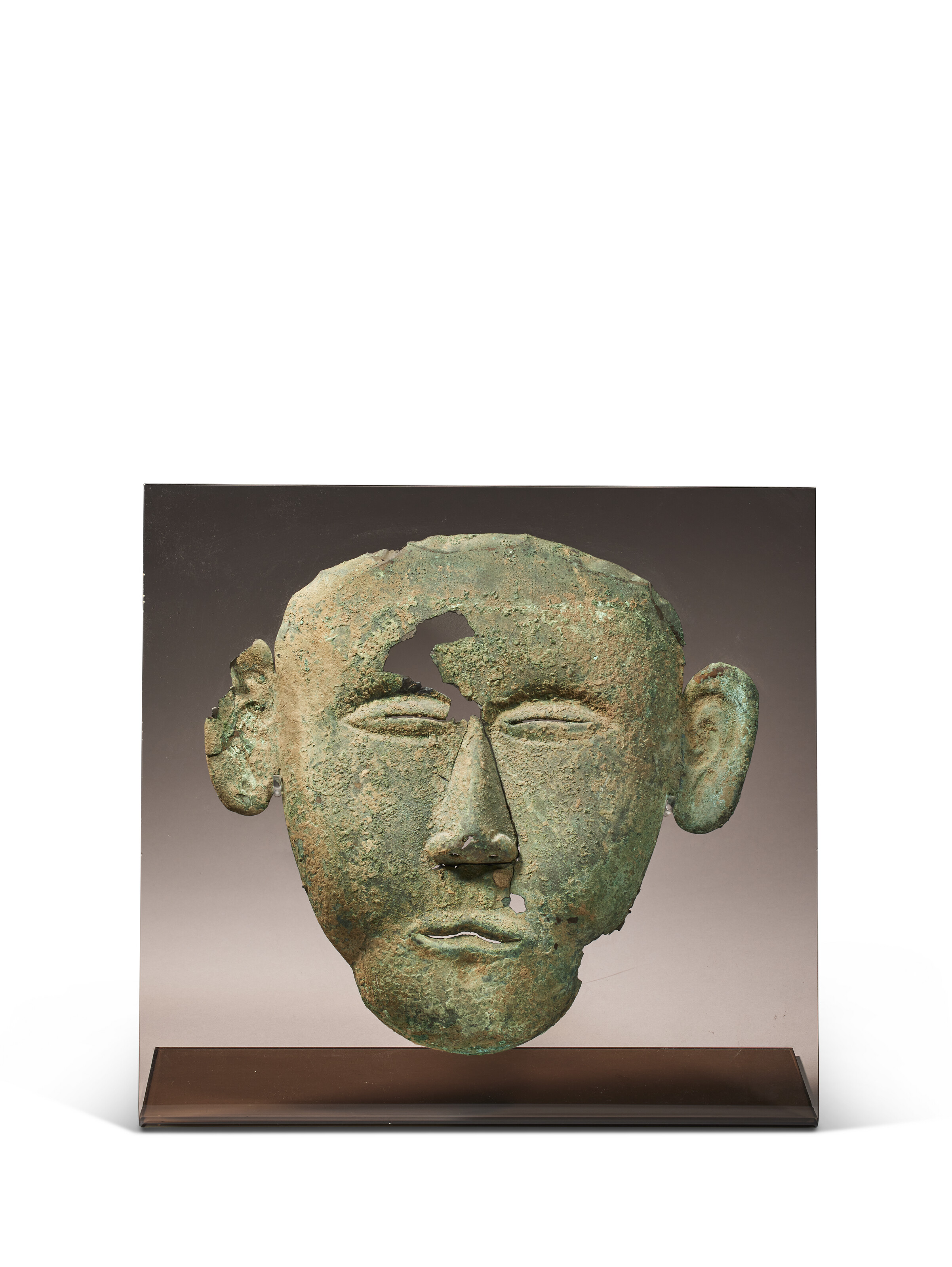 A BRONZE MASK, CHINA, LIAO DYNASTY (907-1125) | Christie’s
