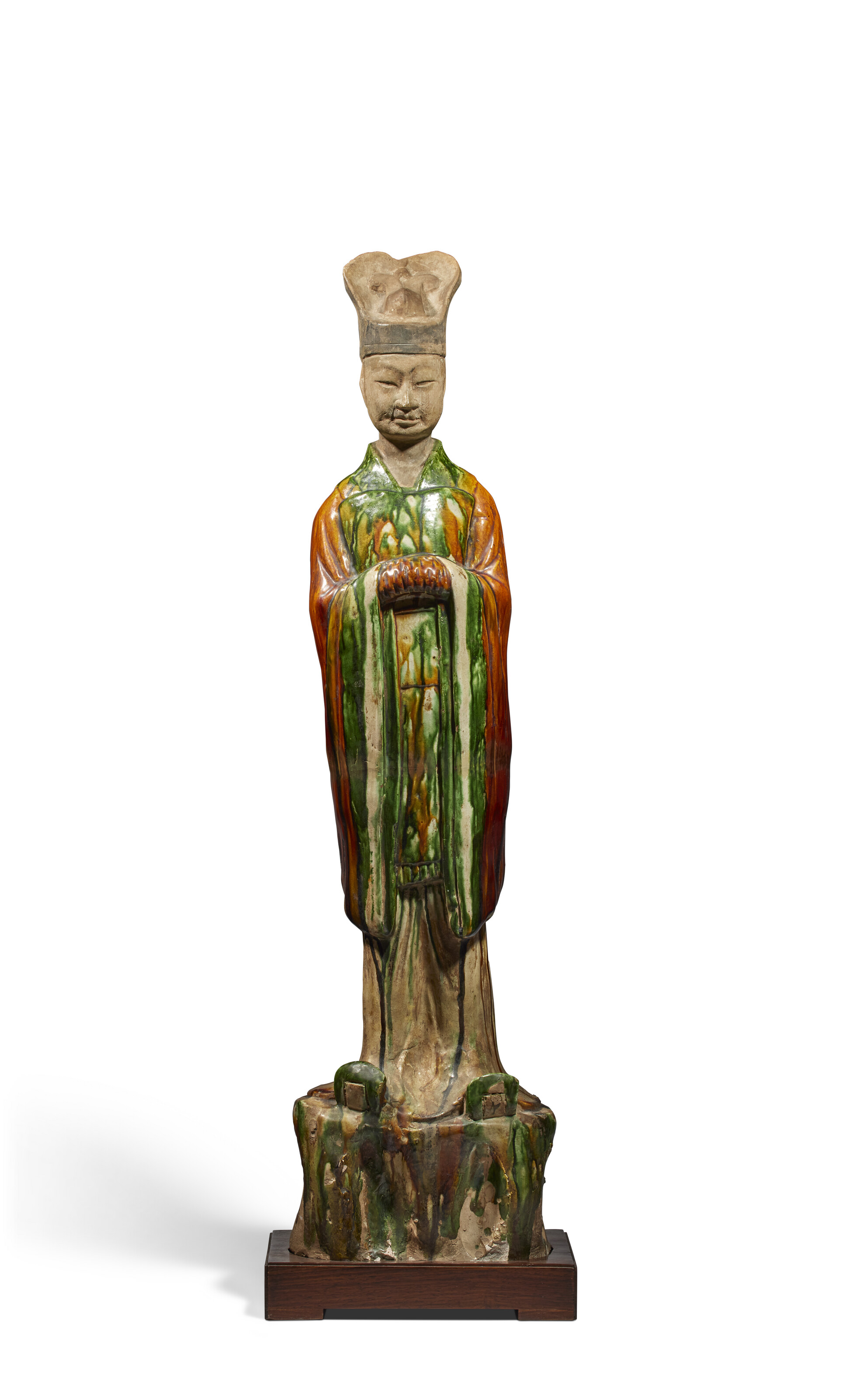 A LARGE SANCAI-GLAZED POTTERY FIGURE OF AN OFFICIAL, CHINA, TANG ...