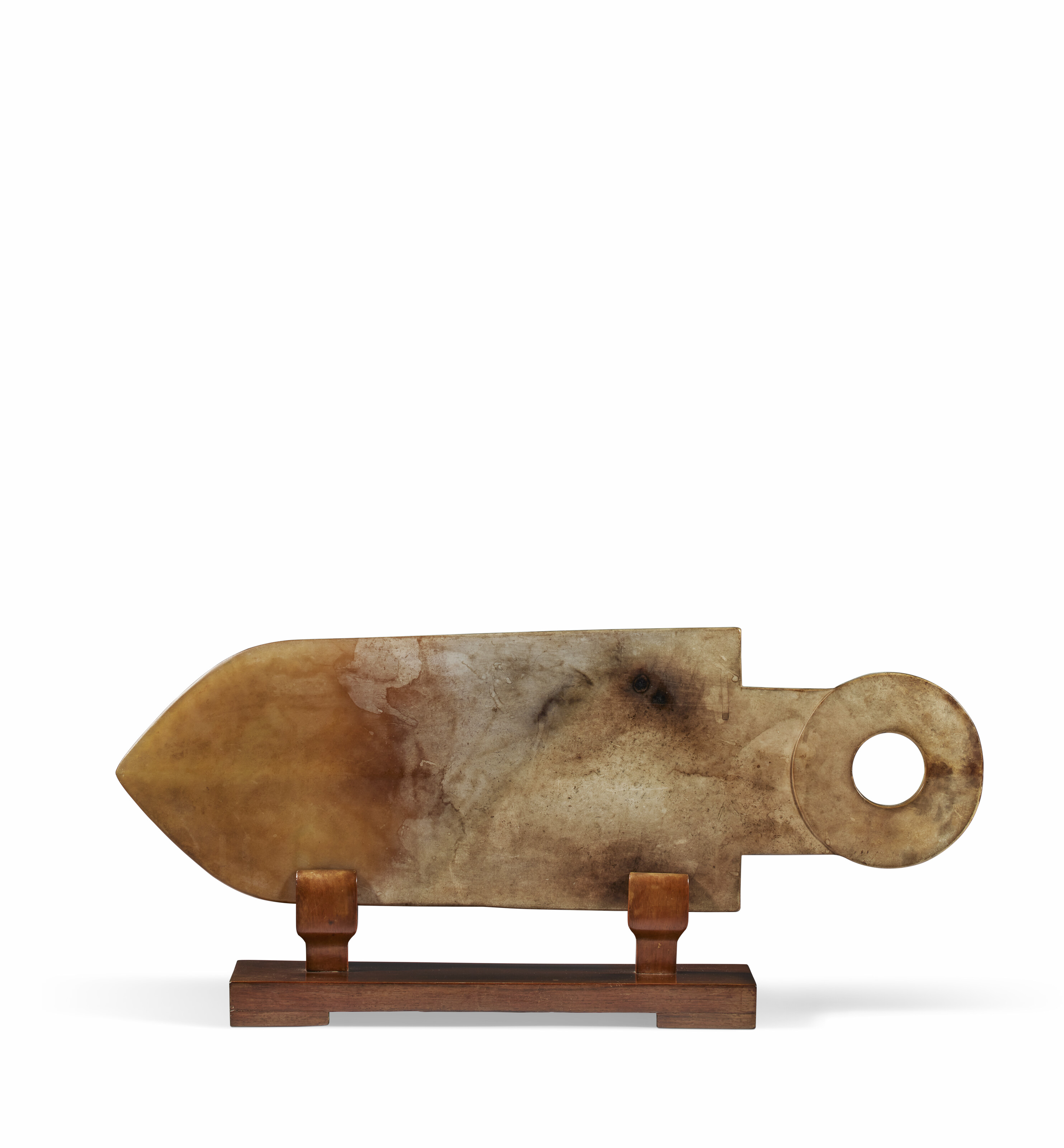 A LARGE MOTTLED BEIGE JADE BLADE, CHINA | Christie’s