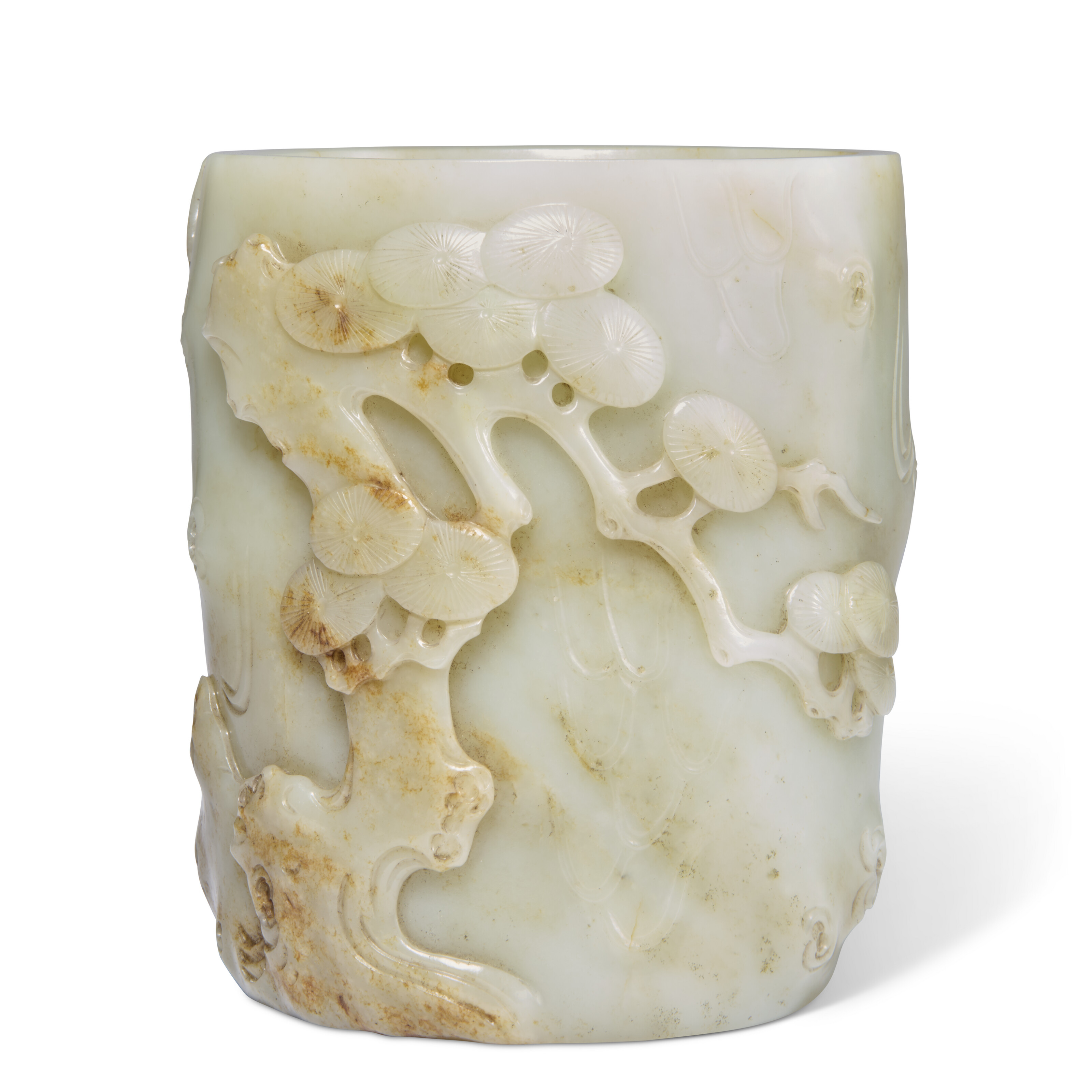 A WHITE AND RUSSET JADE 'PINE' BRUSH POT, CHINA, 17TH-18TH CENTURY ...
