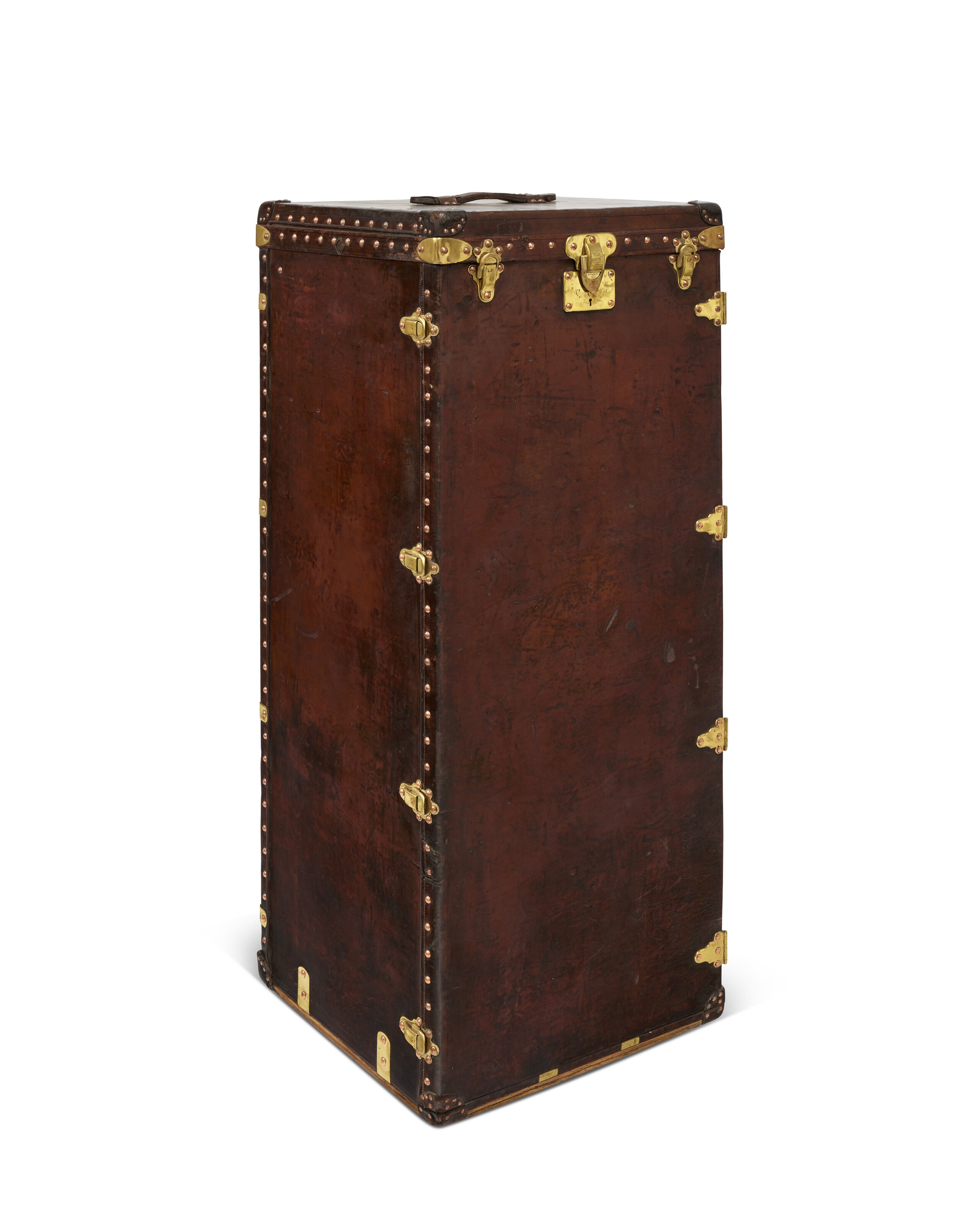 A NATURAL COWHIDE LEATHER WARDROBE TRUNK WITH BRASS HARDWARE, LOUIS ...