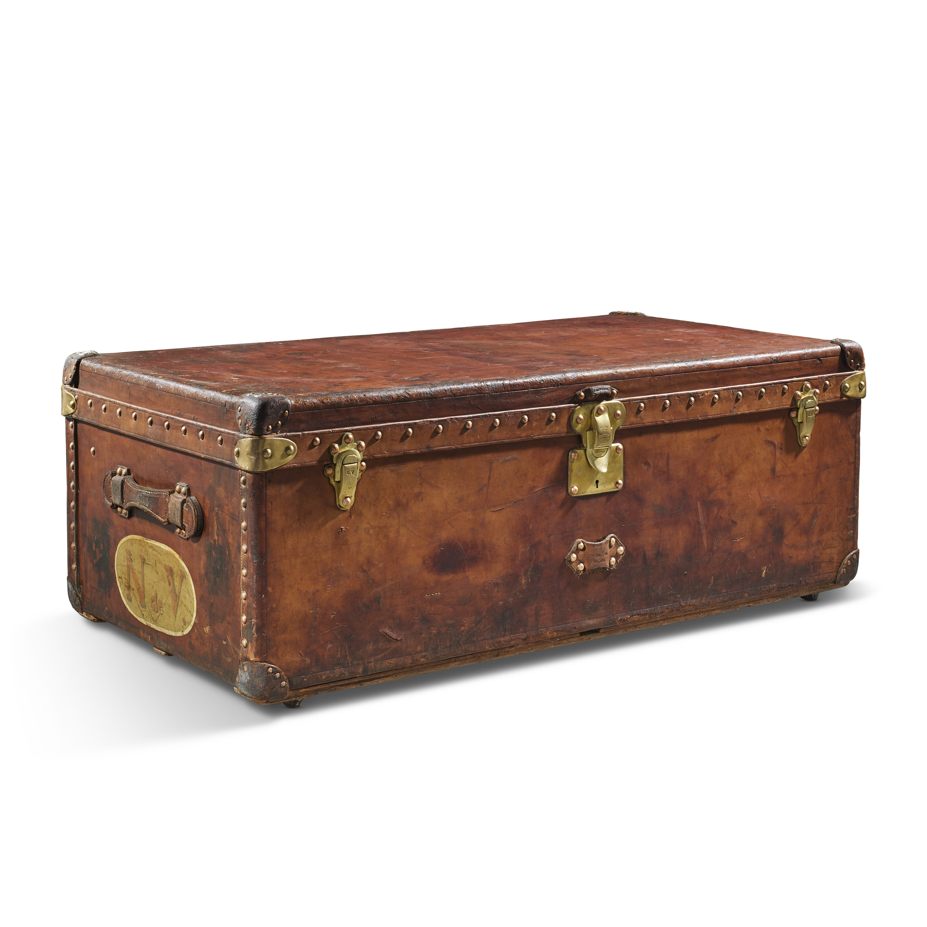 A NATURAL COWHIDE LEATHER TRUNK WITH BRASS HARDWARE, LOUIS VUITTON ...