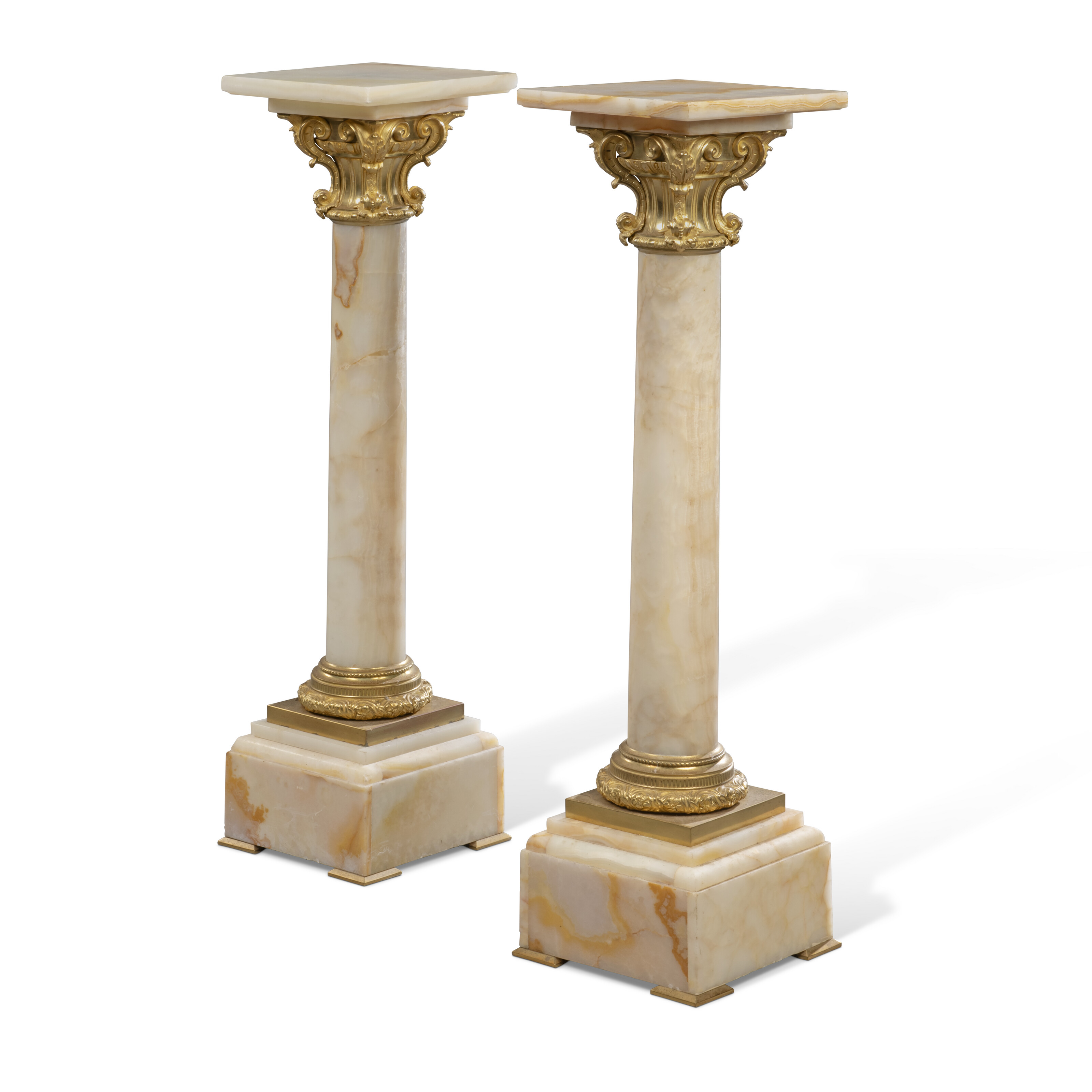 A PAIR OF FRENCH ORMOLU-MOUNTED ONYX PEDESTAL COLUMNS, LATE 19TH ...