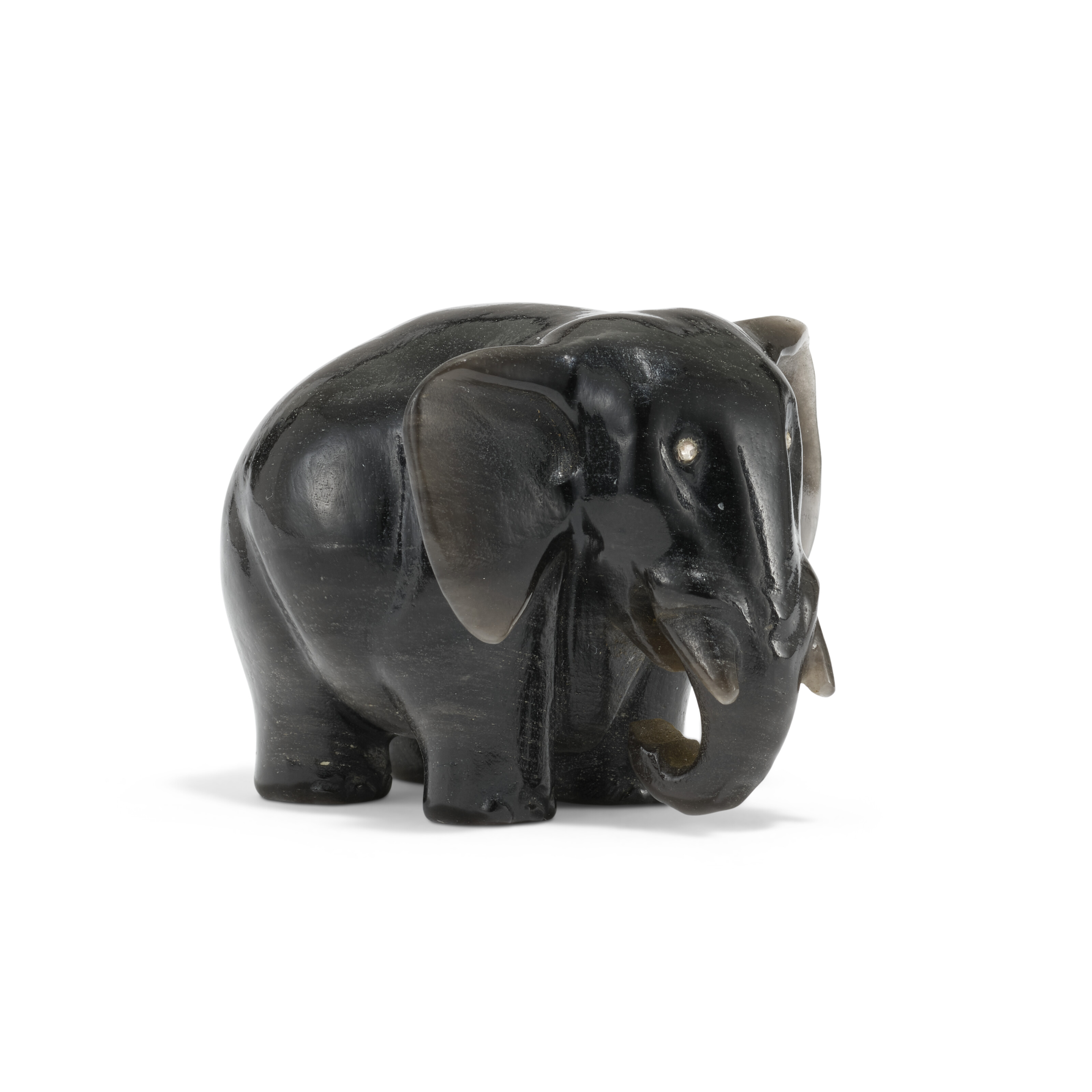 A JEWELLED OBSIDIAN MODEL OF AN ELEPHANT, BY FABERGÉ, ST PETERSBURG ...