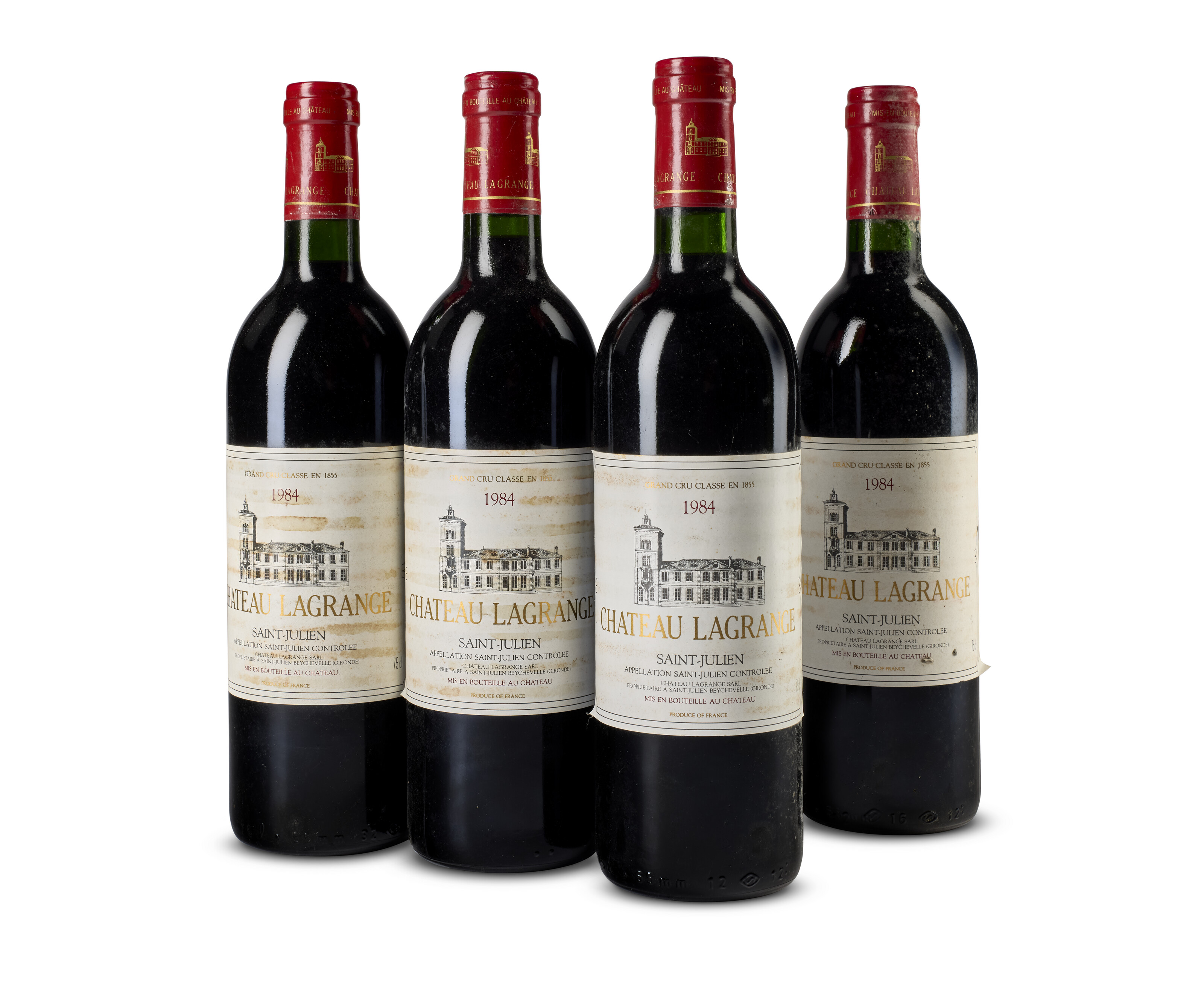 Château Lagrange 1984, Saint-Julien, 3ème Cru Classé Damaged capsules. Badly bin-soiled labels ...