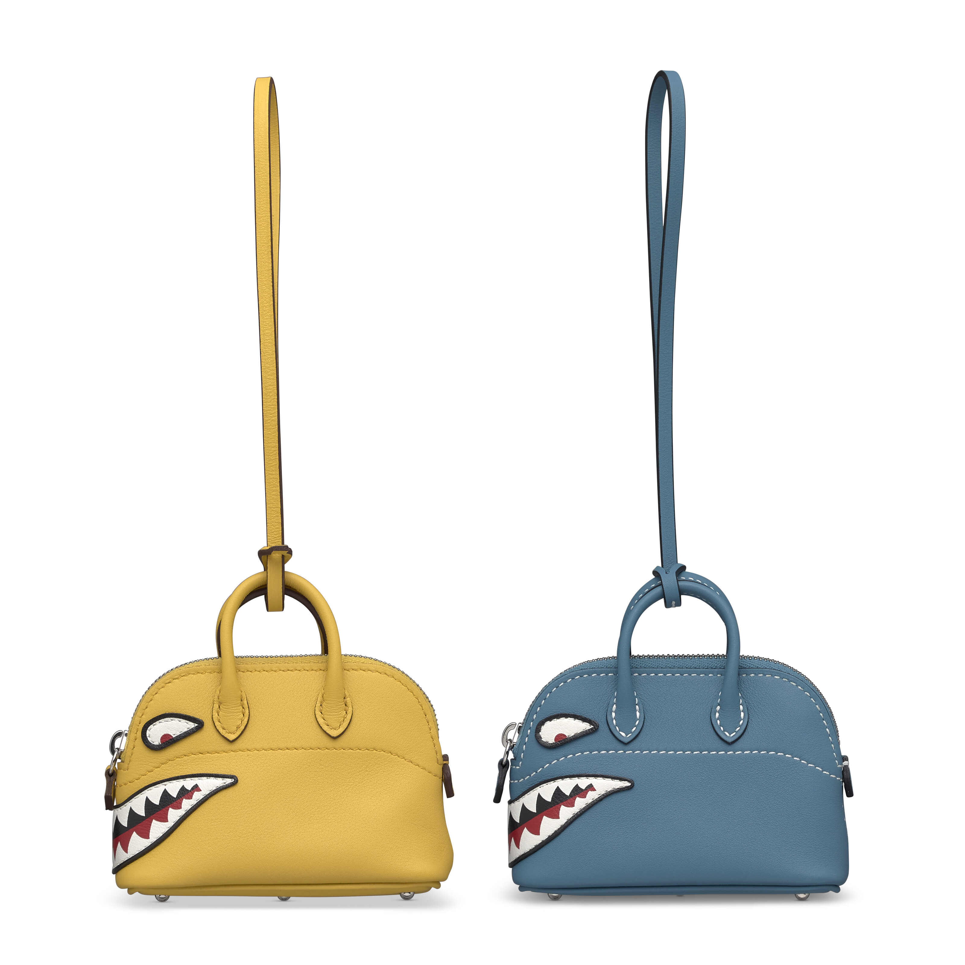 A SET OF TWO: A SUN SWIFT BOLIDE SHARK BAG CHARM WITH PALLADIUM ...