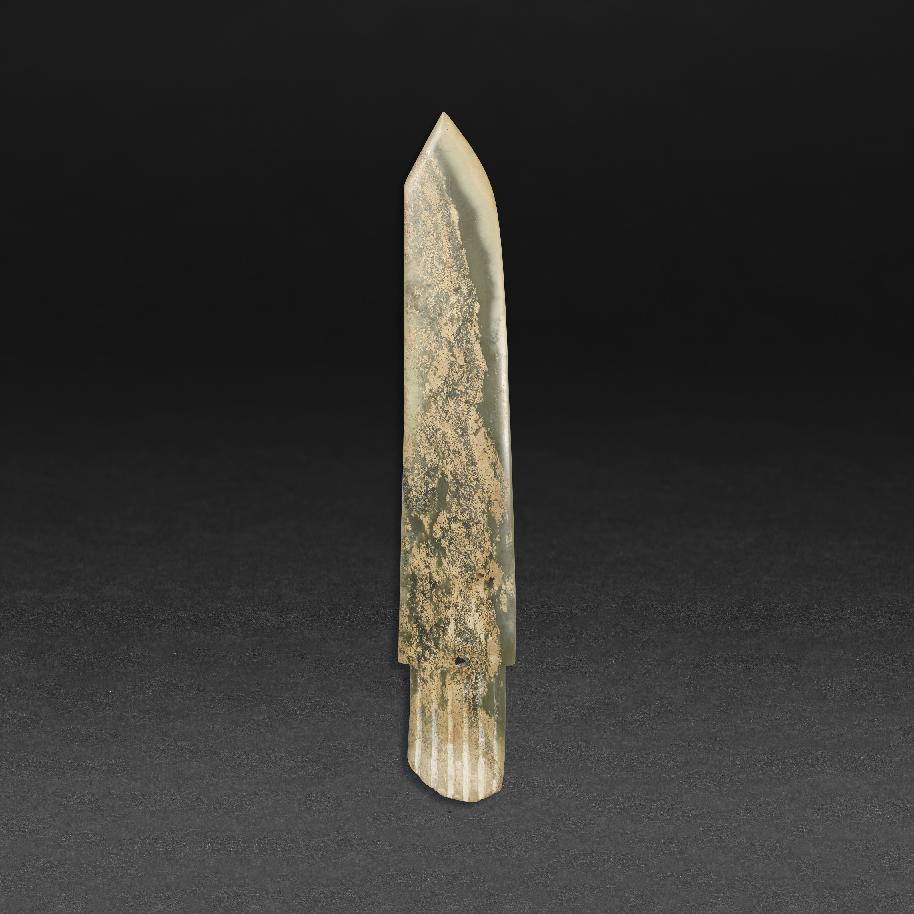 A LARGE CELADON AND RUSSET JADE GE-HALBERD BLADE, | Christie’s