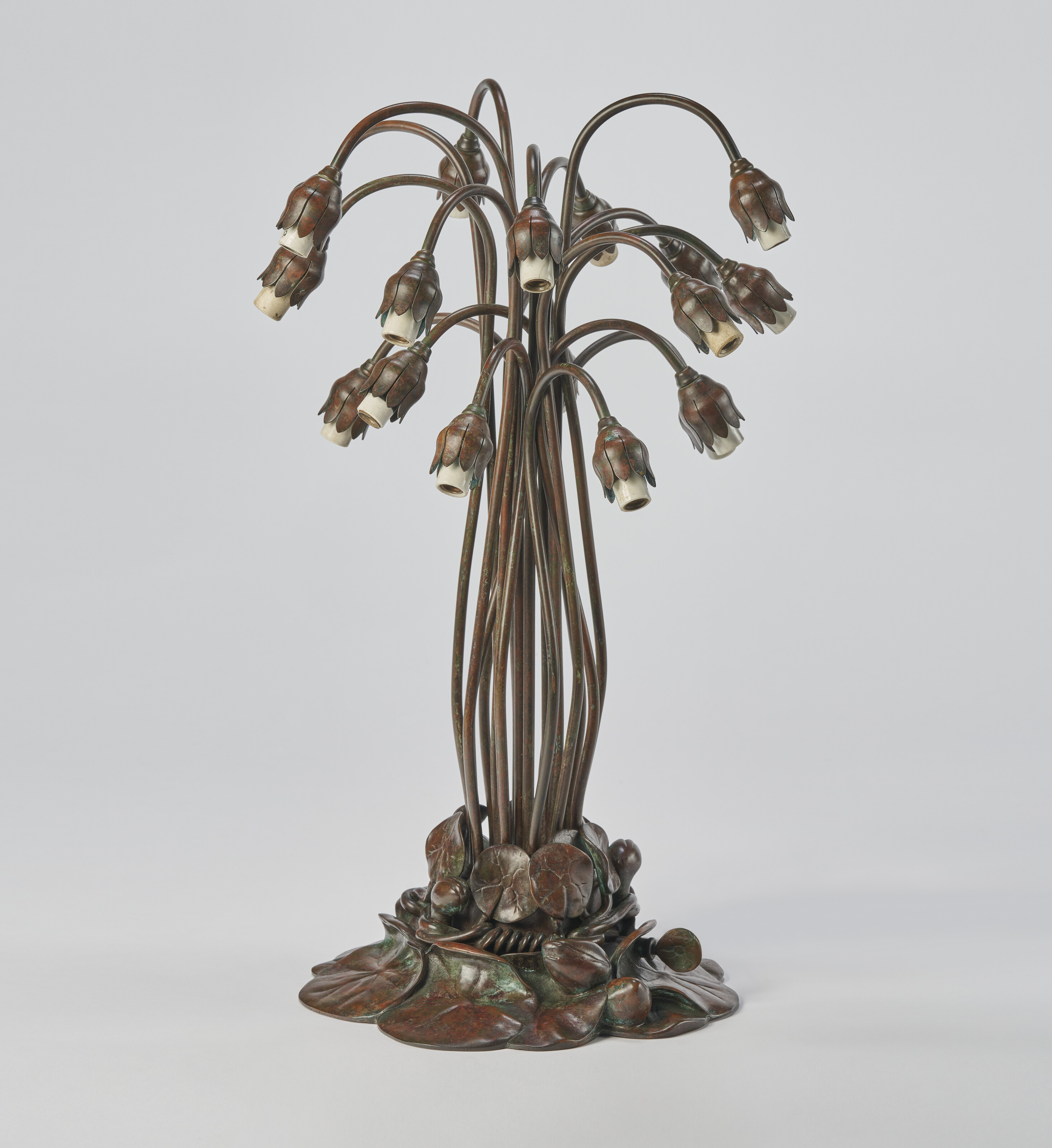 TIFFANY STUDIOS, Eighteen-Light 'Lily' Lamp Base, circa 1904 | Christie’s