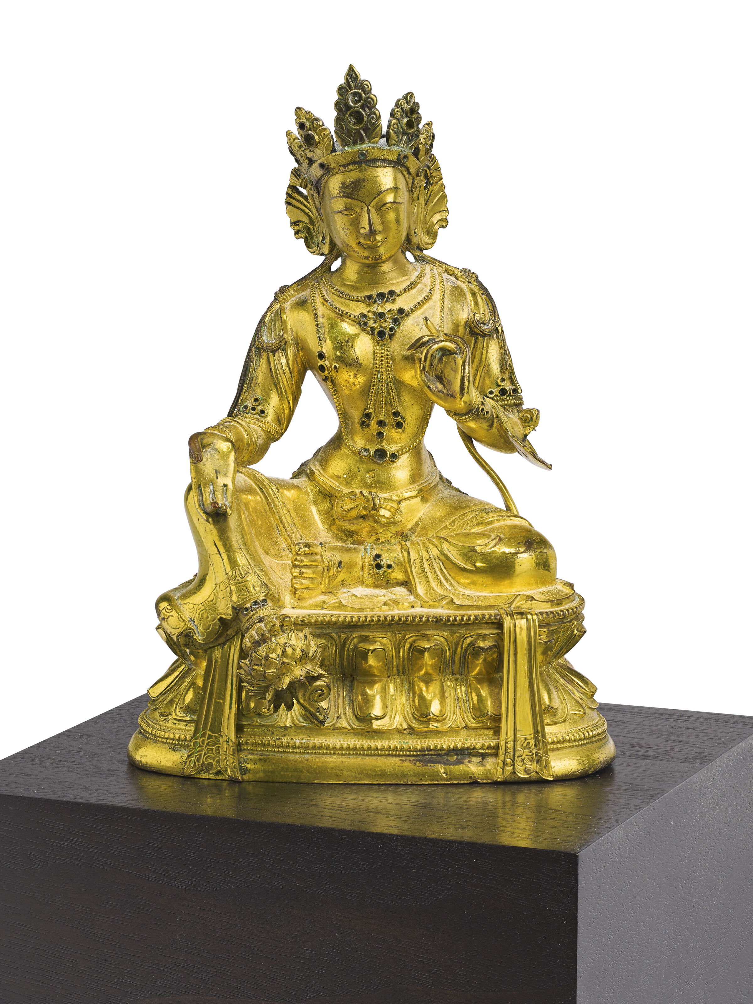 A GILT-BRONZE FIGURE OF GREEN TARA, TIBETO-CHINESE, 18TH CENTURY ...