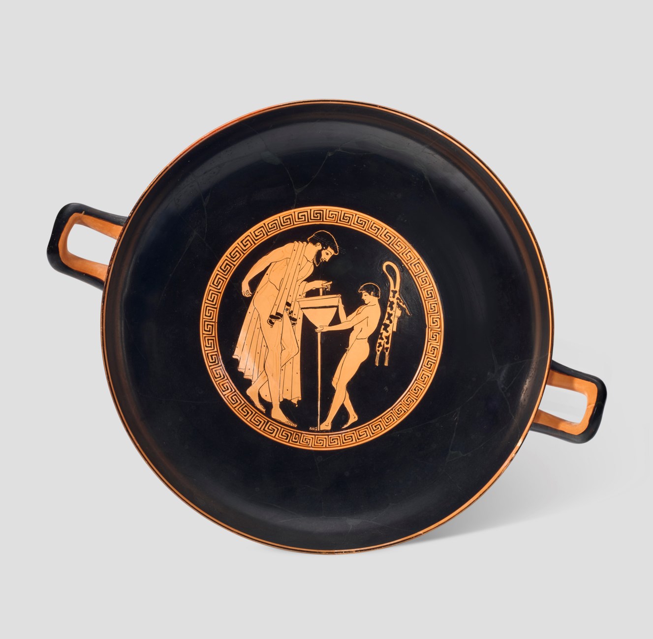 AN ATTIC RED-FIGURED KYLIX, ATTRIBUTED TO THE BRYGOS PAINTER, CIRCA 490 ...