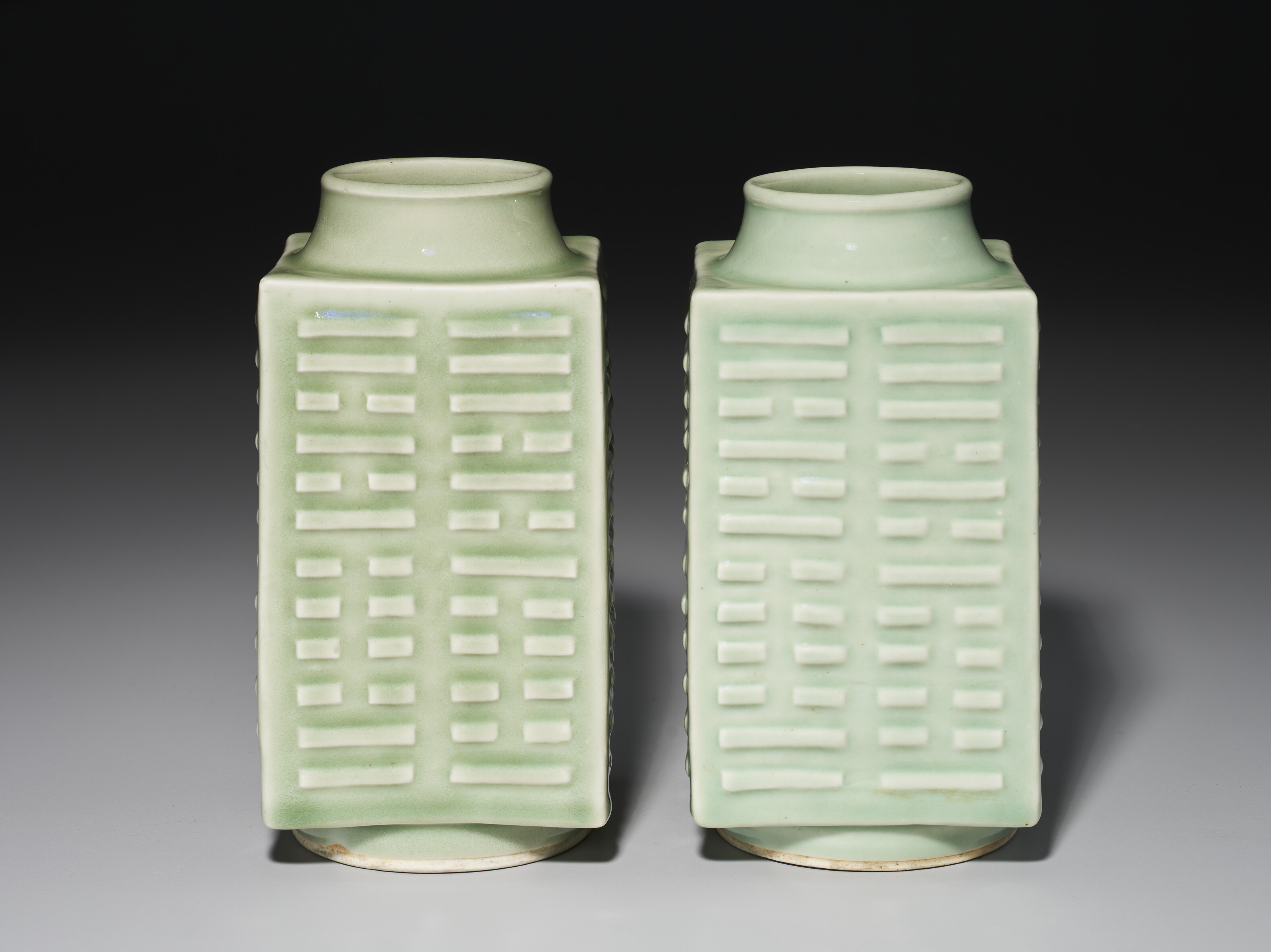 A PAIR OF CELADON-GLAZED CONG-FORM VASES, CHINA | Christie’s