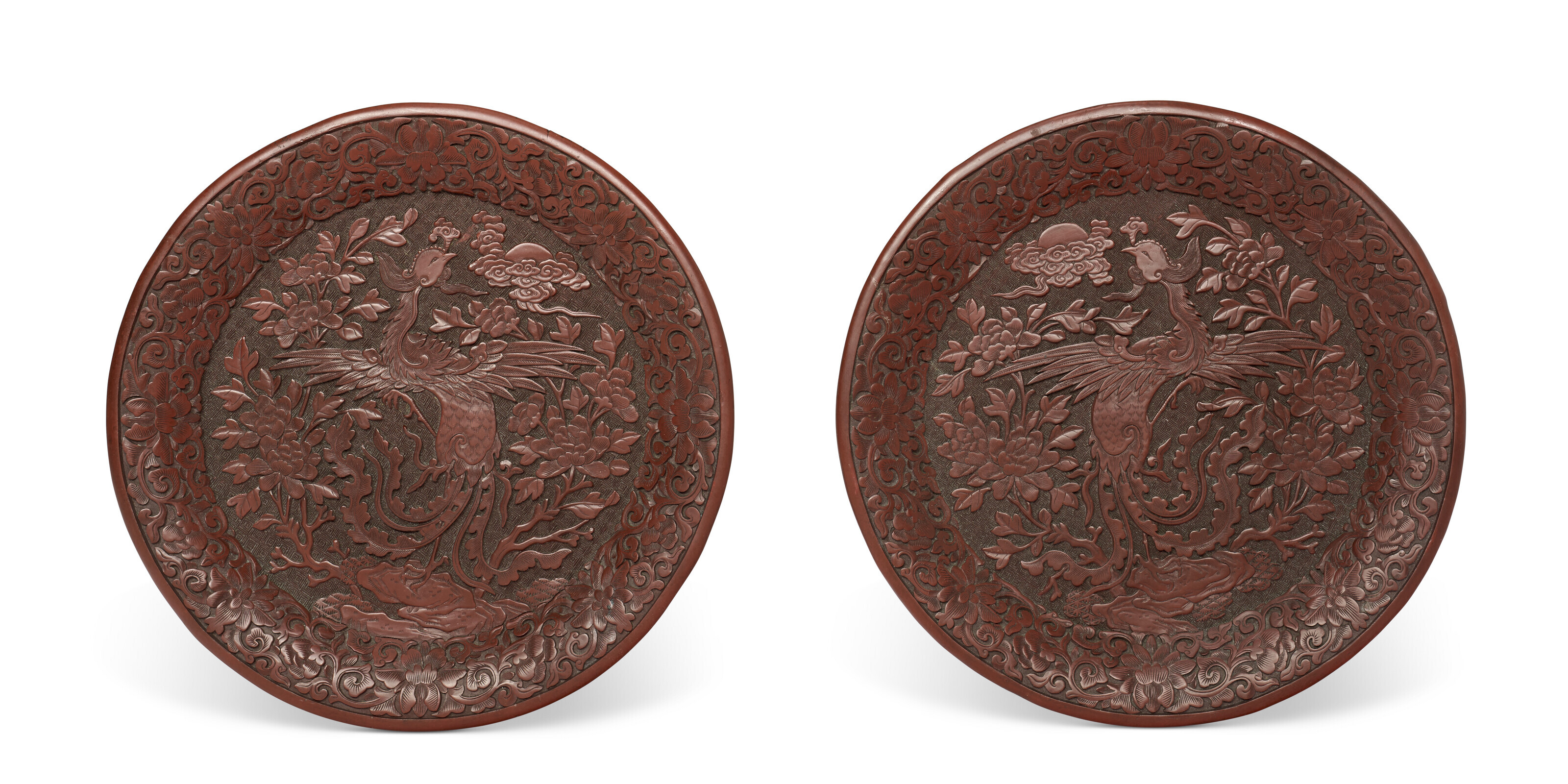 A PAIR OF CARVED RED LACQUER ‘PHOENIX’ DISHES, CHINA, LATE QING DYNASTY ...