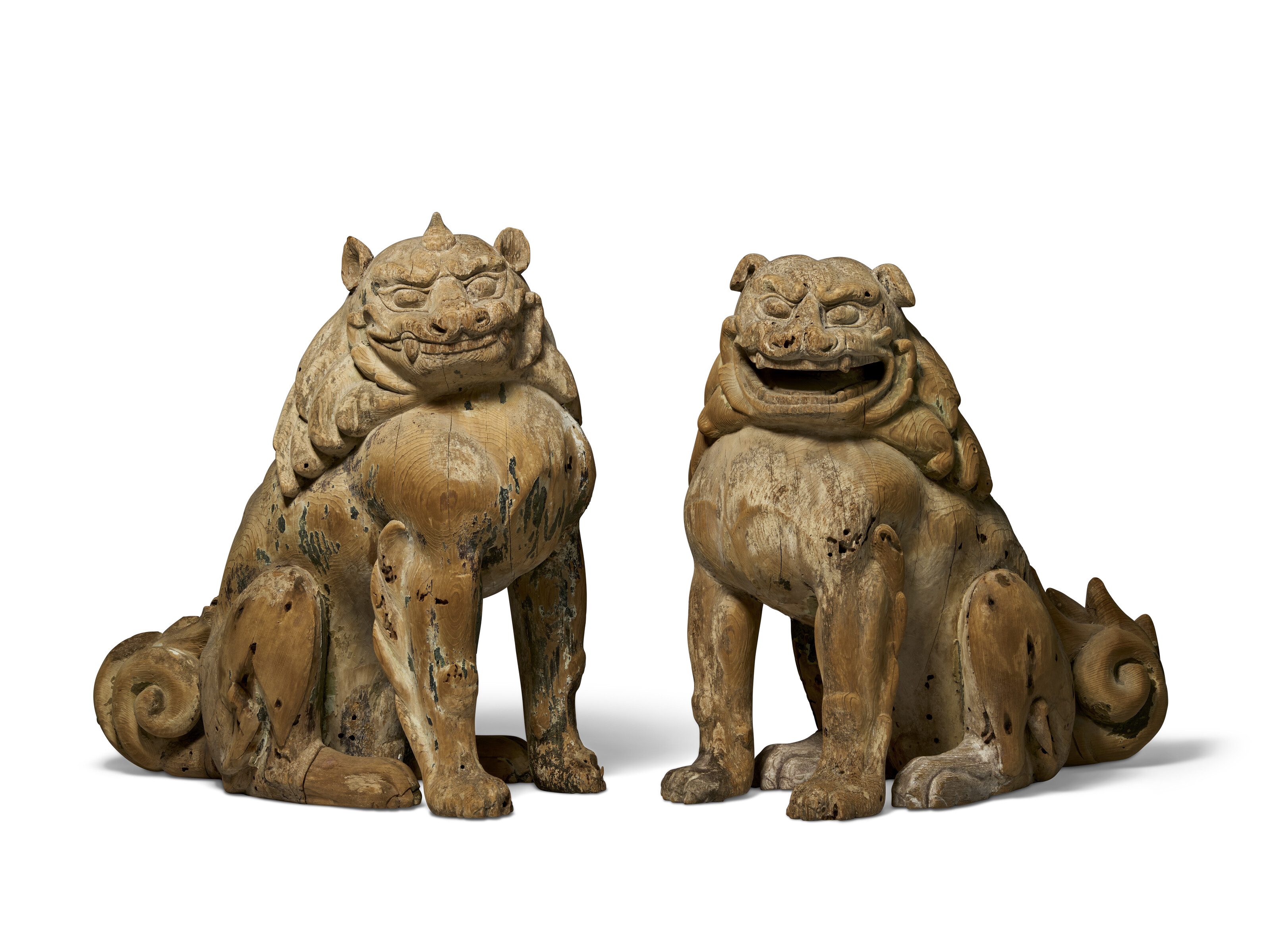 A PAIR OF CARVED WOOD SCULPTURES OF KOMA-INU (LION-DOG), JAPAN, LATE ...