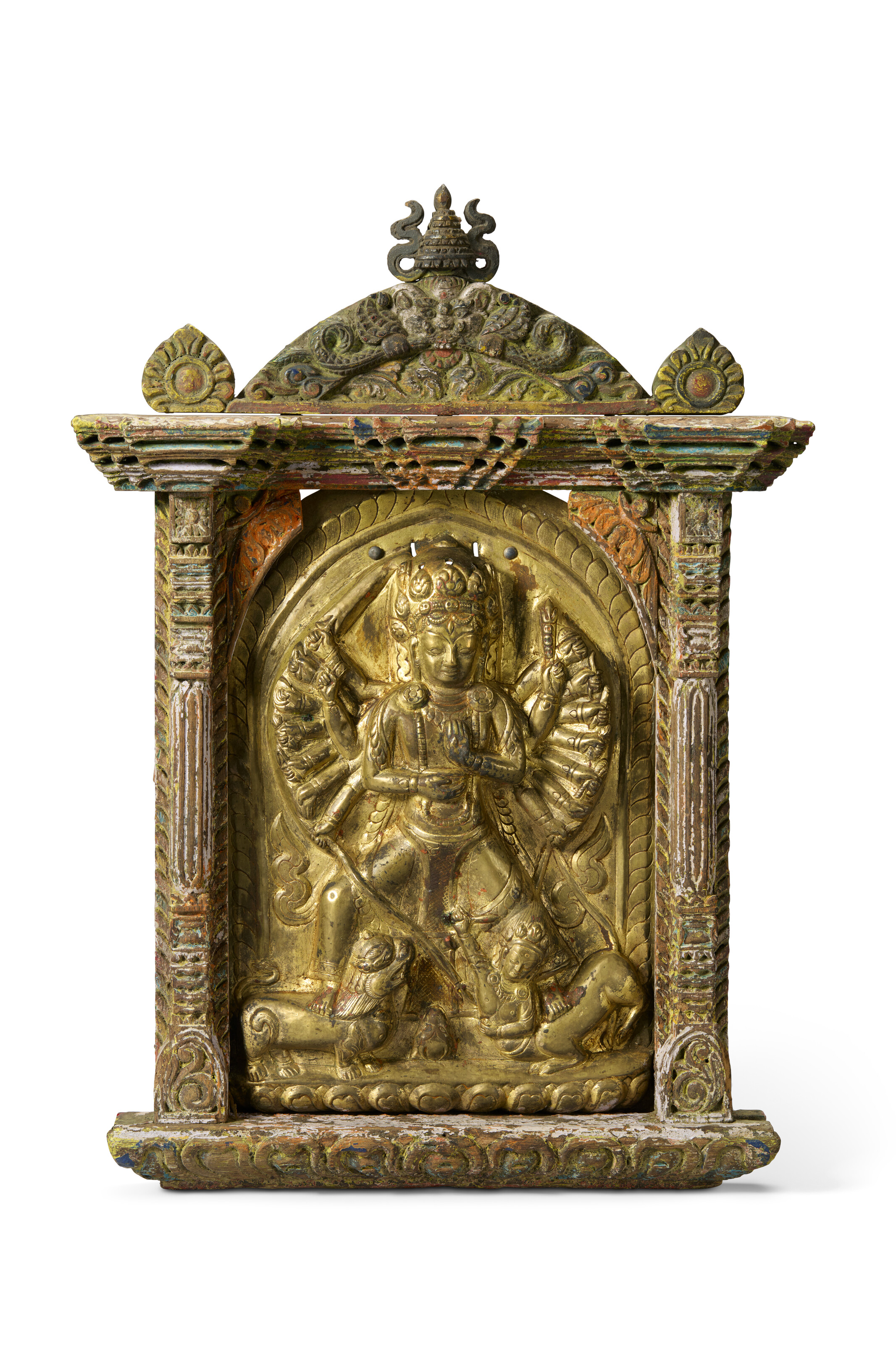 A REPOUSSÉ GILT-COPPER AND WOOD SHRINE OF DURGA, NEPAL, 19TH CENTURY ...