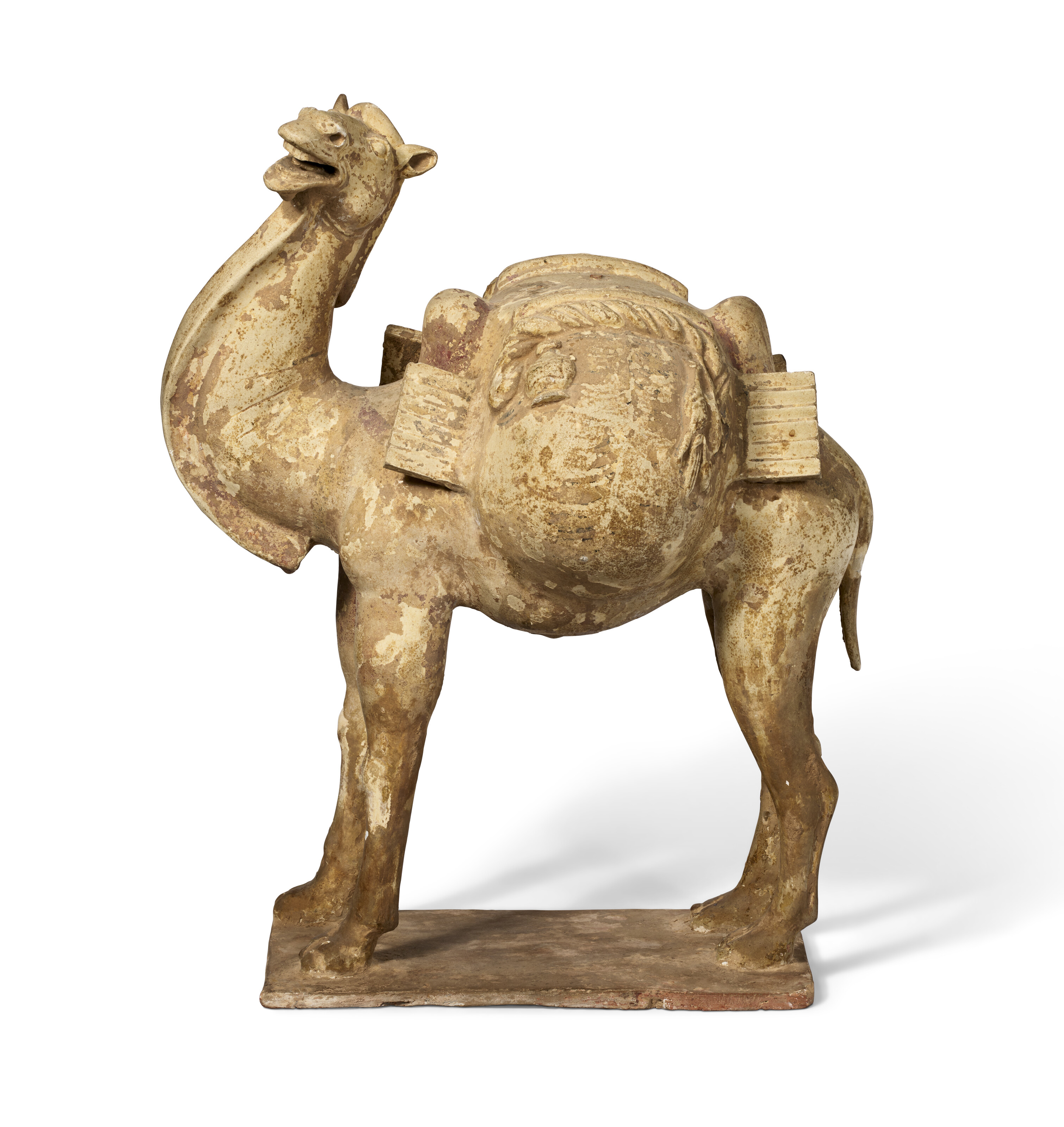 A STRAW-GLAZED POTTERY FIGURE OF A LADEN BACTRIAN CAMEL, CHINA, TANG ...