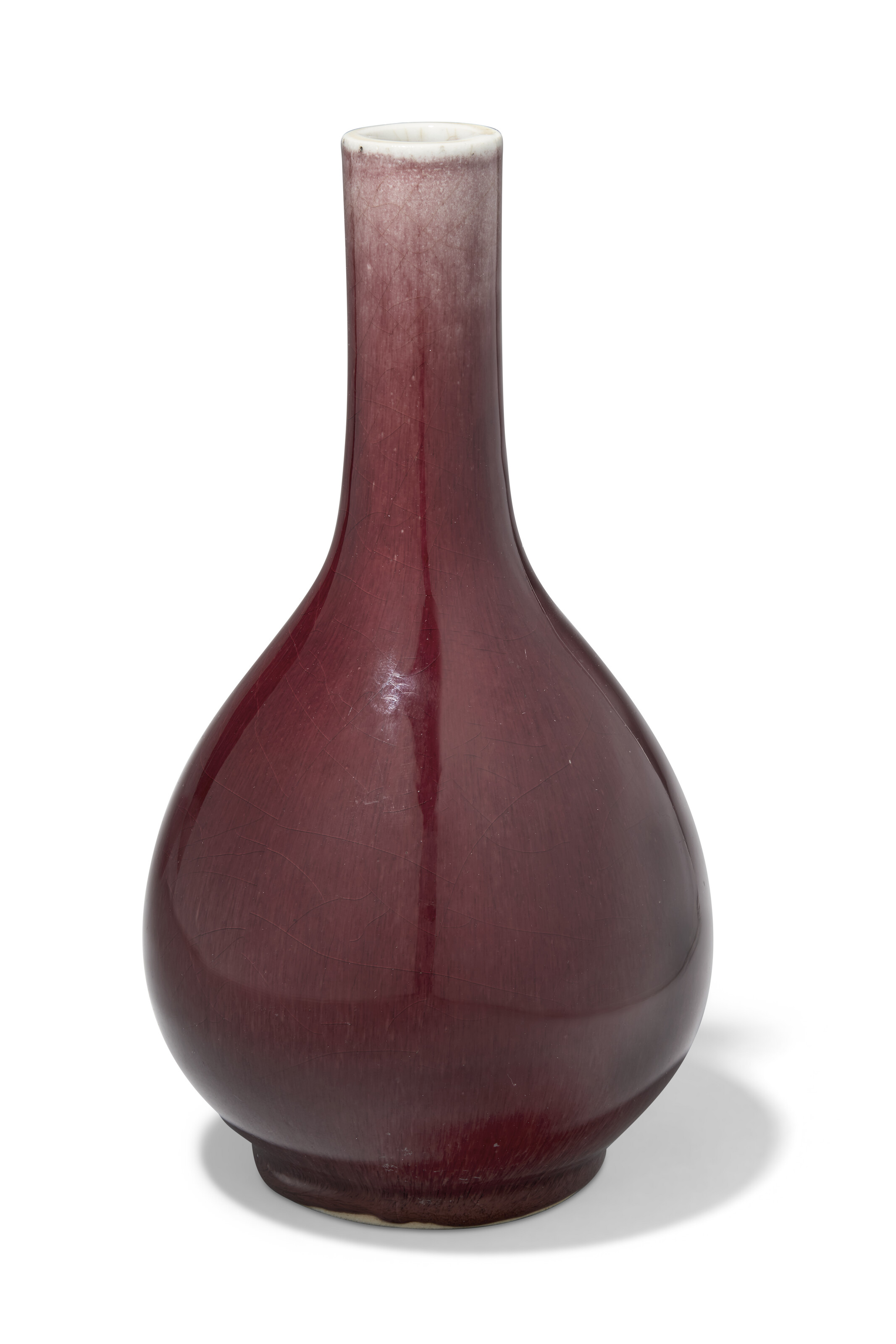 A COPPER-RED-GLAZED BOTTLE VASE, CHINA, 18TH-19TH CENTURY | Christie’s
