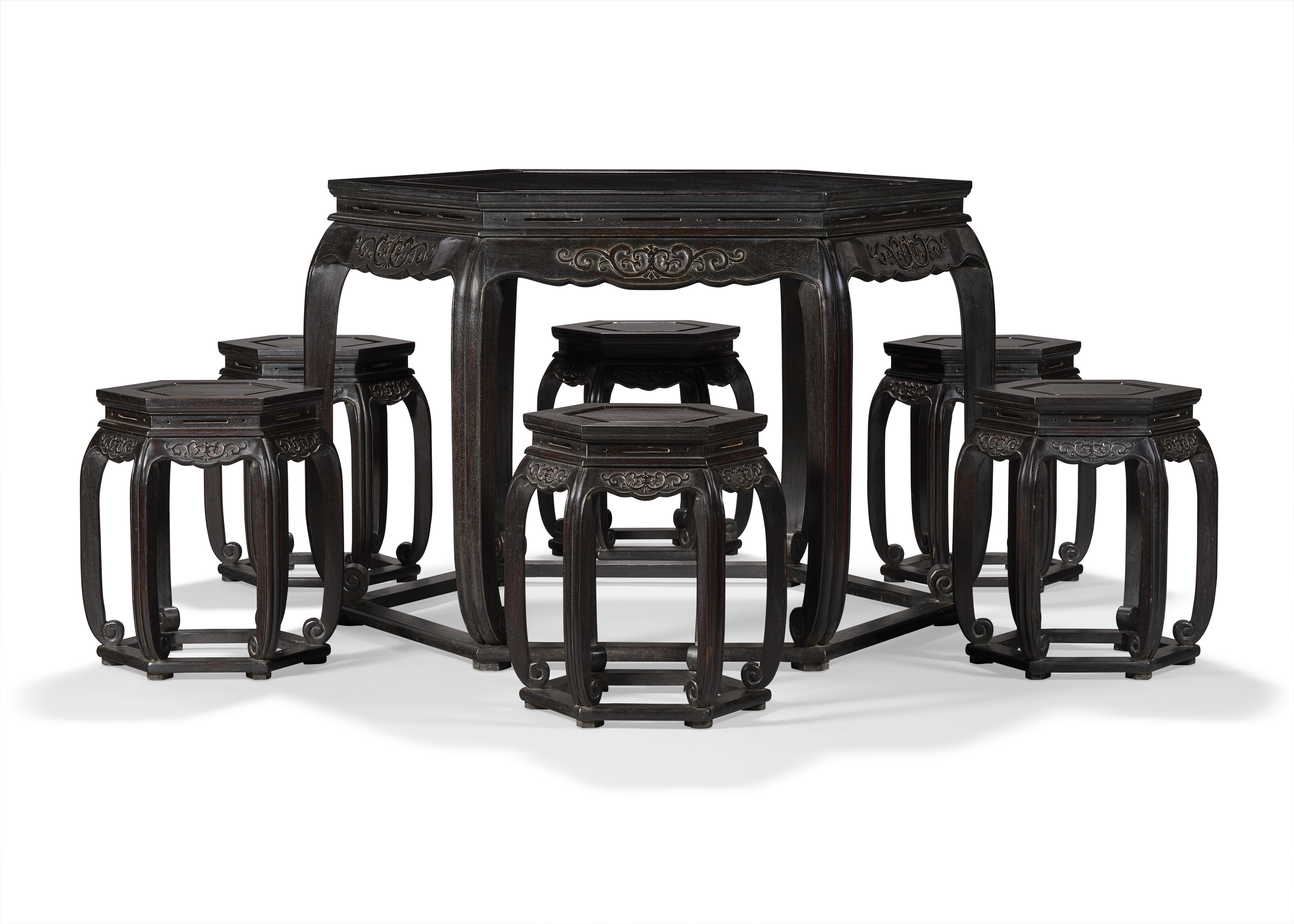 A ZITAN HEXAGONAL TABLE AND SIX ZITAN HEXAGONAL STOOLS, CHINA | Christie’s