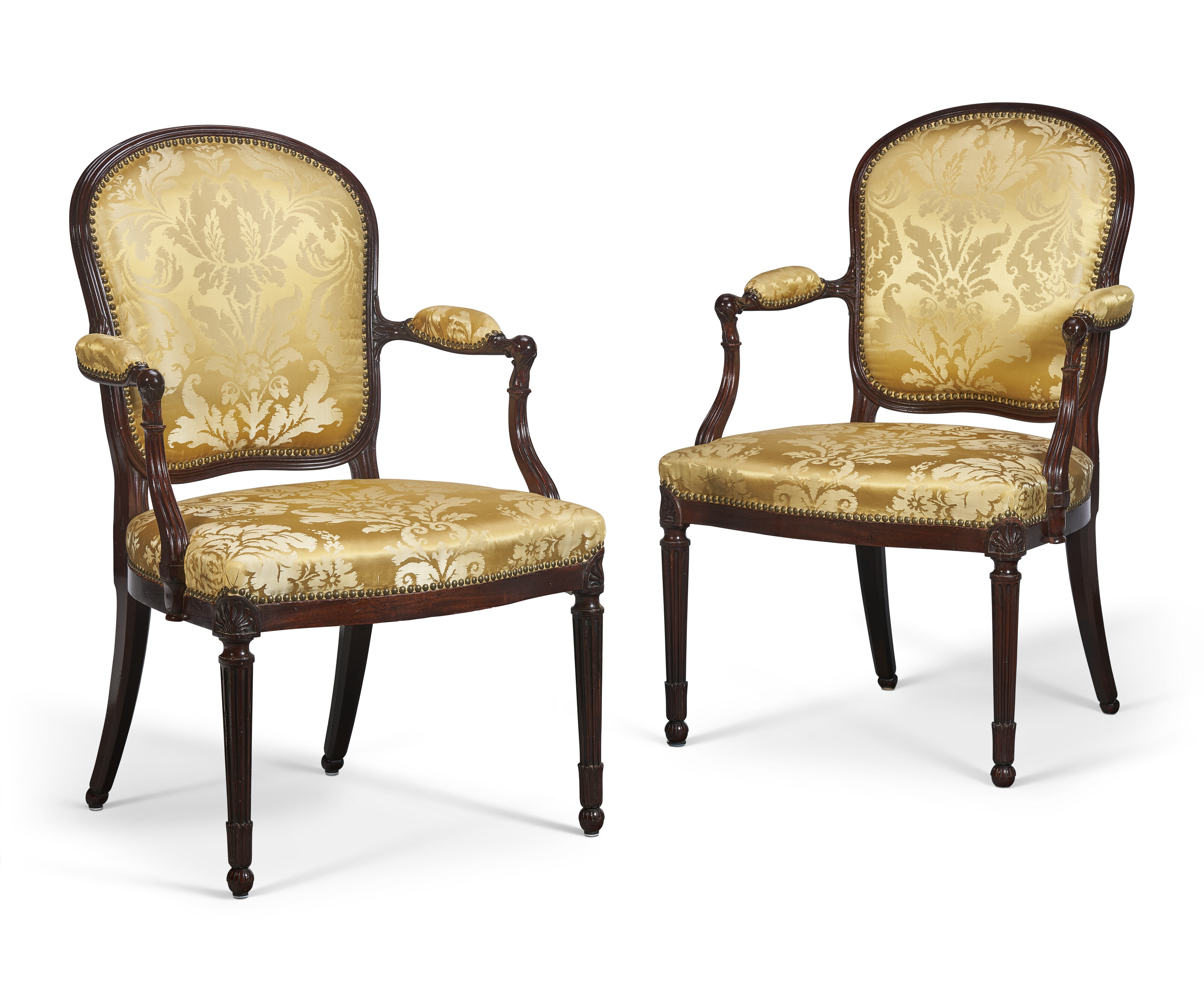 A PAIR OF GEORGE III MAHOGANY ARMCHAIRS, ATTRIBUTED TO JOHN LINNELL ...