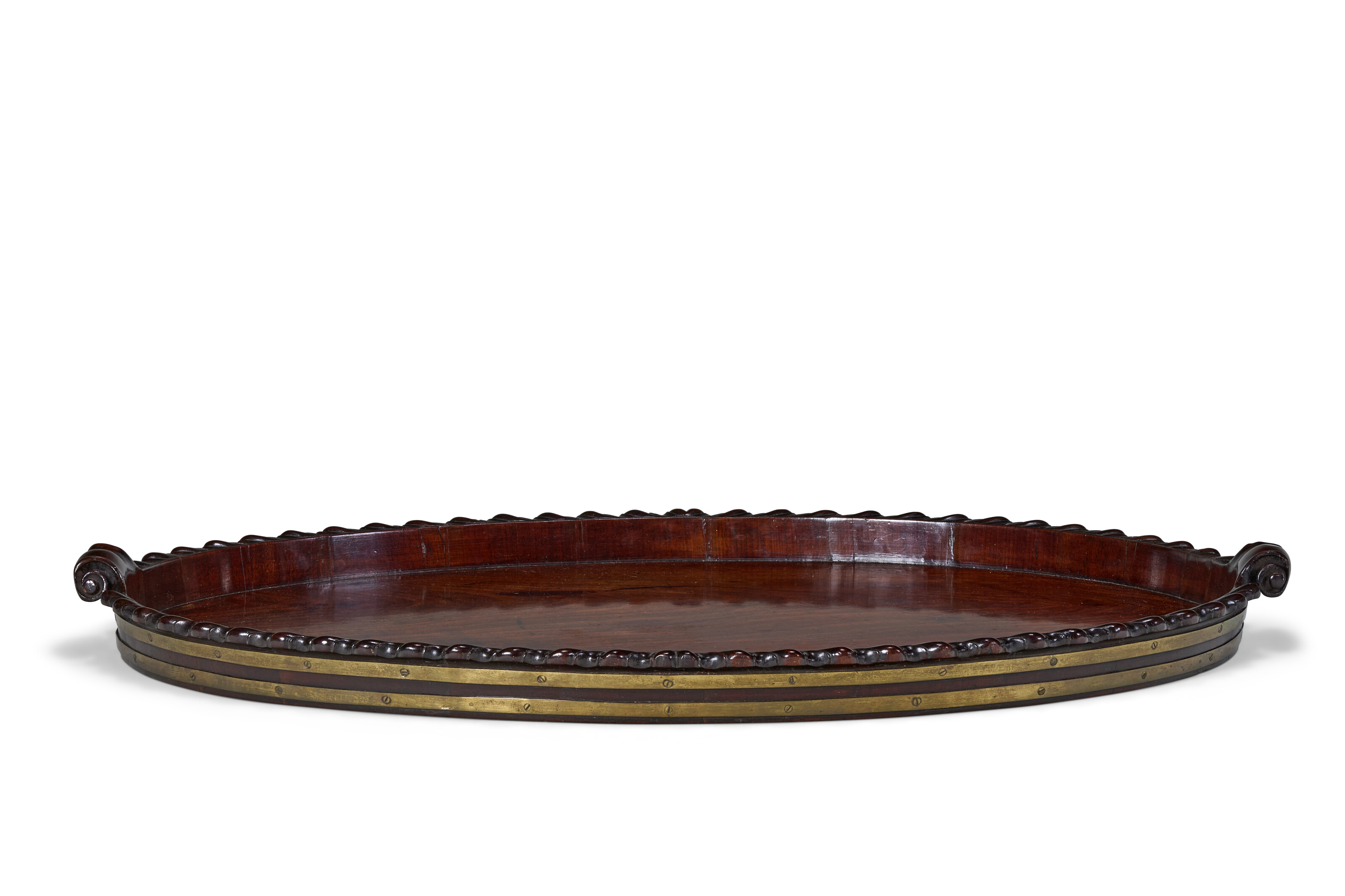 A GEORGE II BRASS-BOUND MAHOGANY OVAL TRAY, CIRCA 1755 | Christie’s