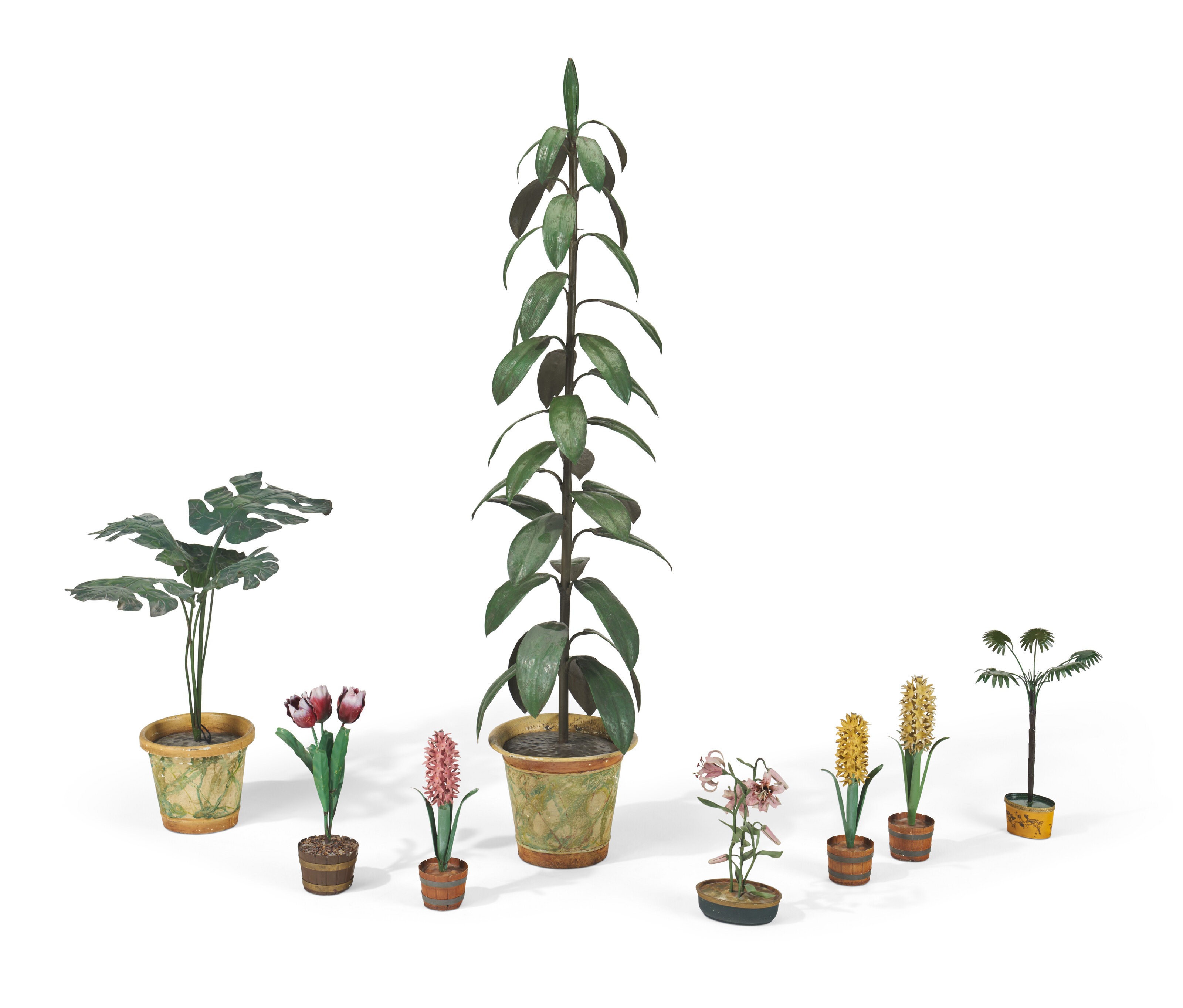 AN ASSEMBLED GROUP OF EIGHT TOLE PEINTE FLOWER AND FOLIAGE GROUPS ...