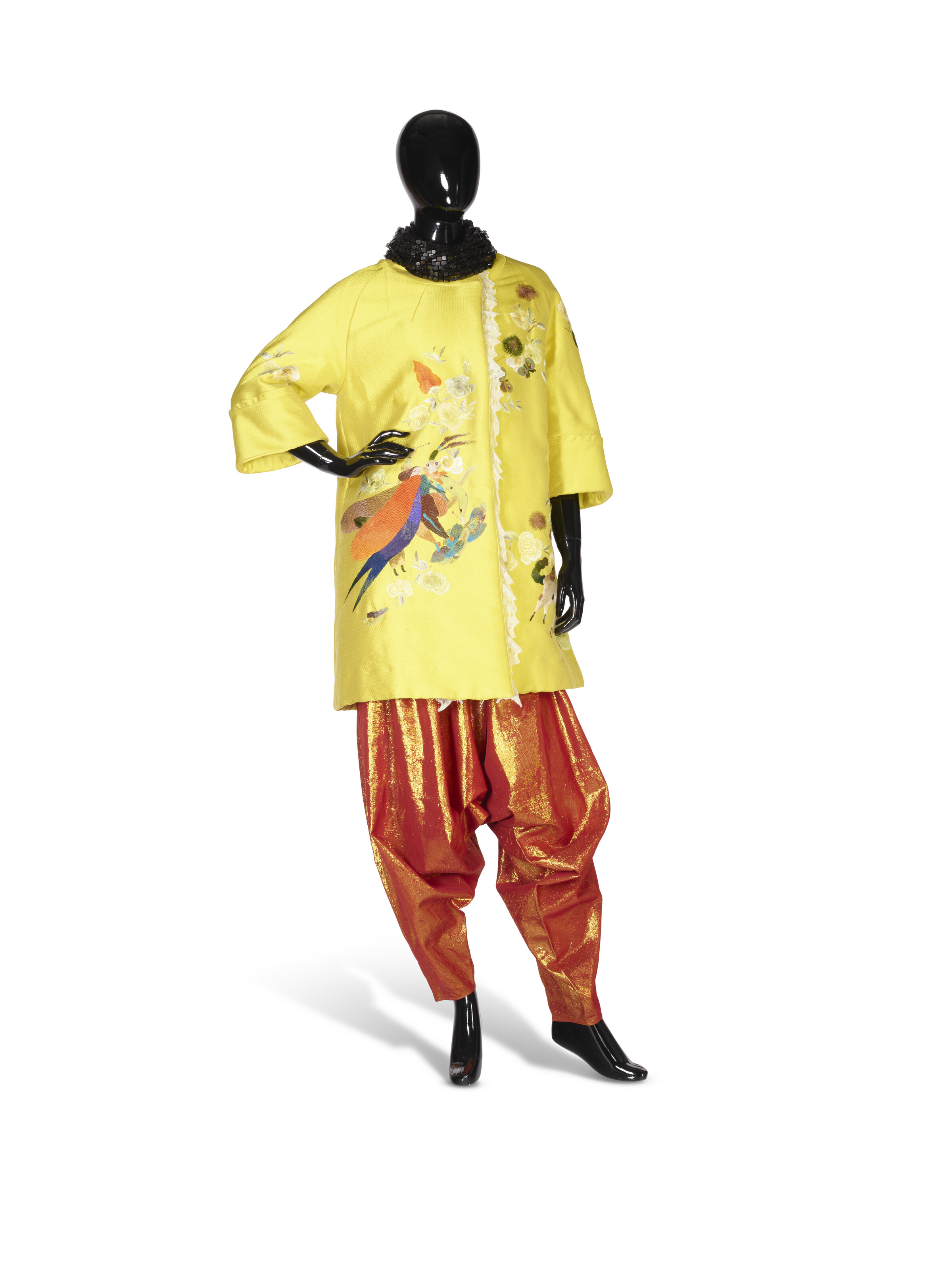 A YELLOW SILK AND EMBROIDERED COAT, LABELED SHIATZY CHEN, LATE 20TH ...