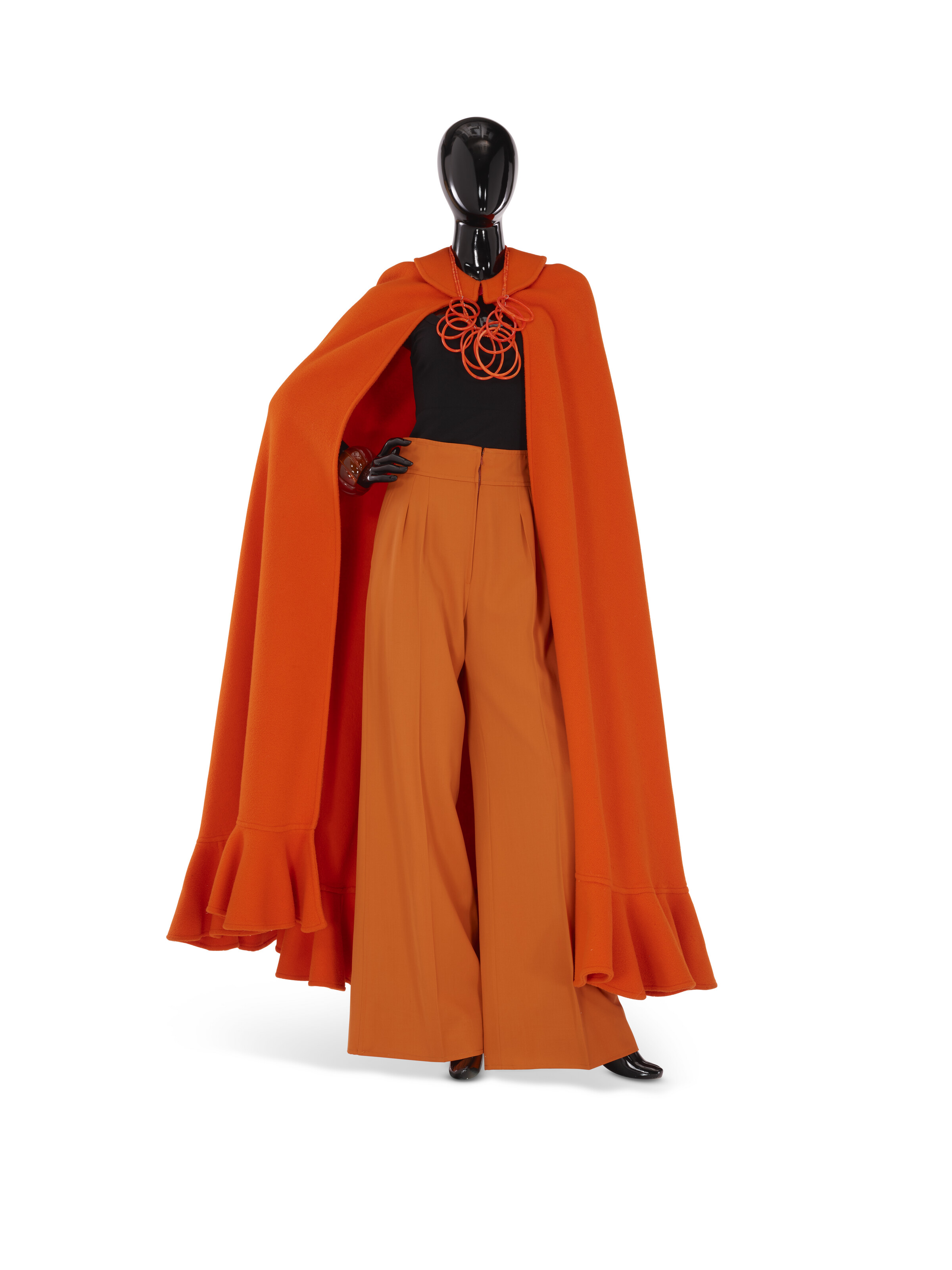 A BRIGHT ORANGE WOOL CAPE, LABELED DIOR FOR SAKS FIFTH AVENUE PARIS/NEW ...