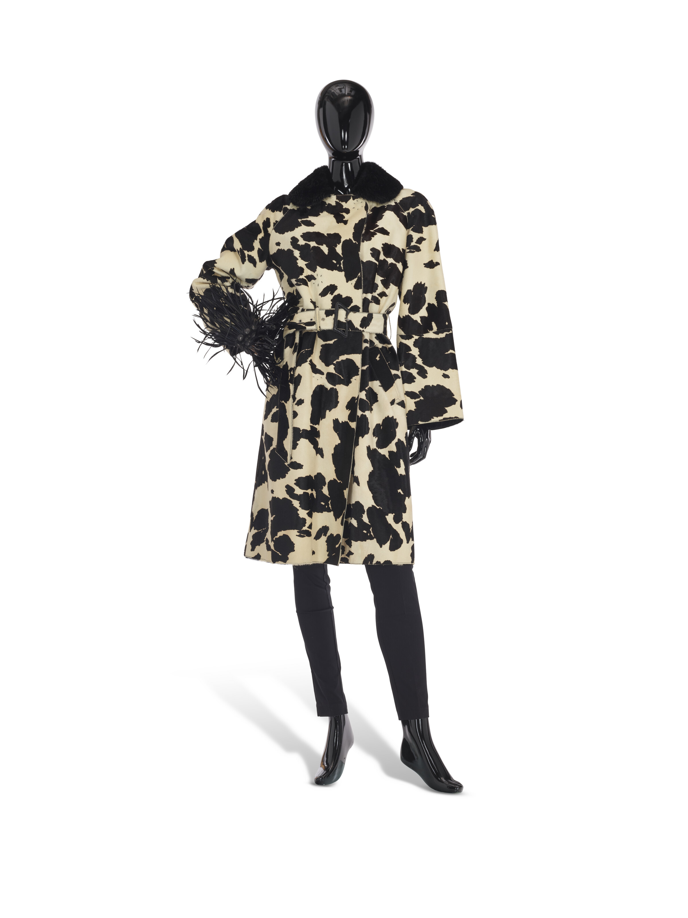 A BLACK AND WHITE SPOTTED CALF HAIR COAT, LABELED D&G, CIRCA 2000 ...