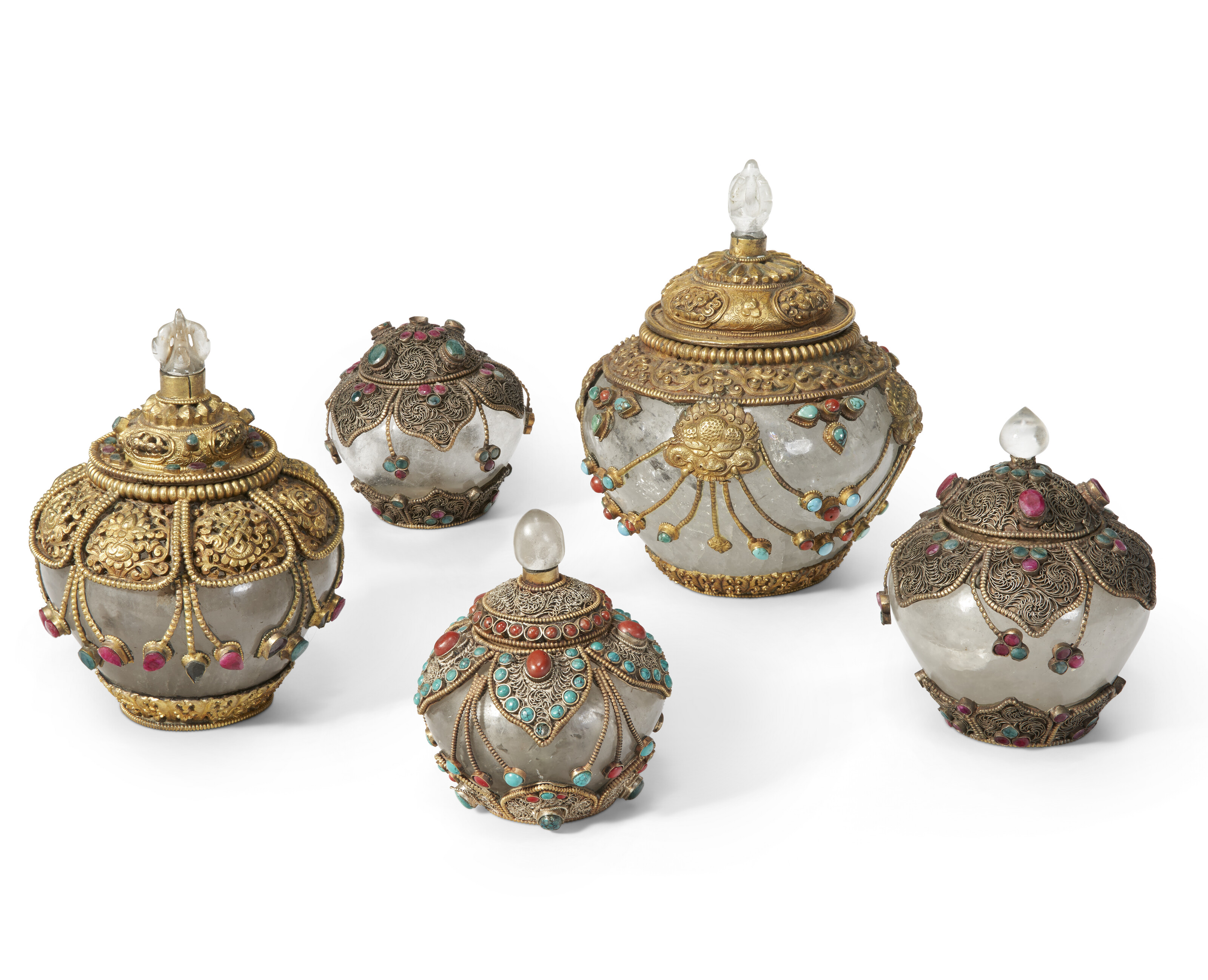 A GROUP OF FIVE ROCK CRYSTAL, GILT AND SILVERED-METAL AND STONE-MOUNTED ...