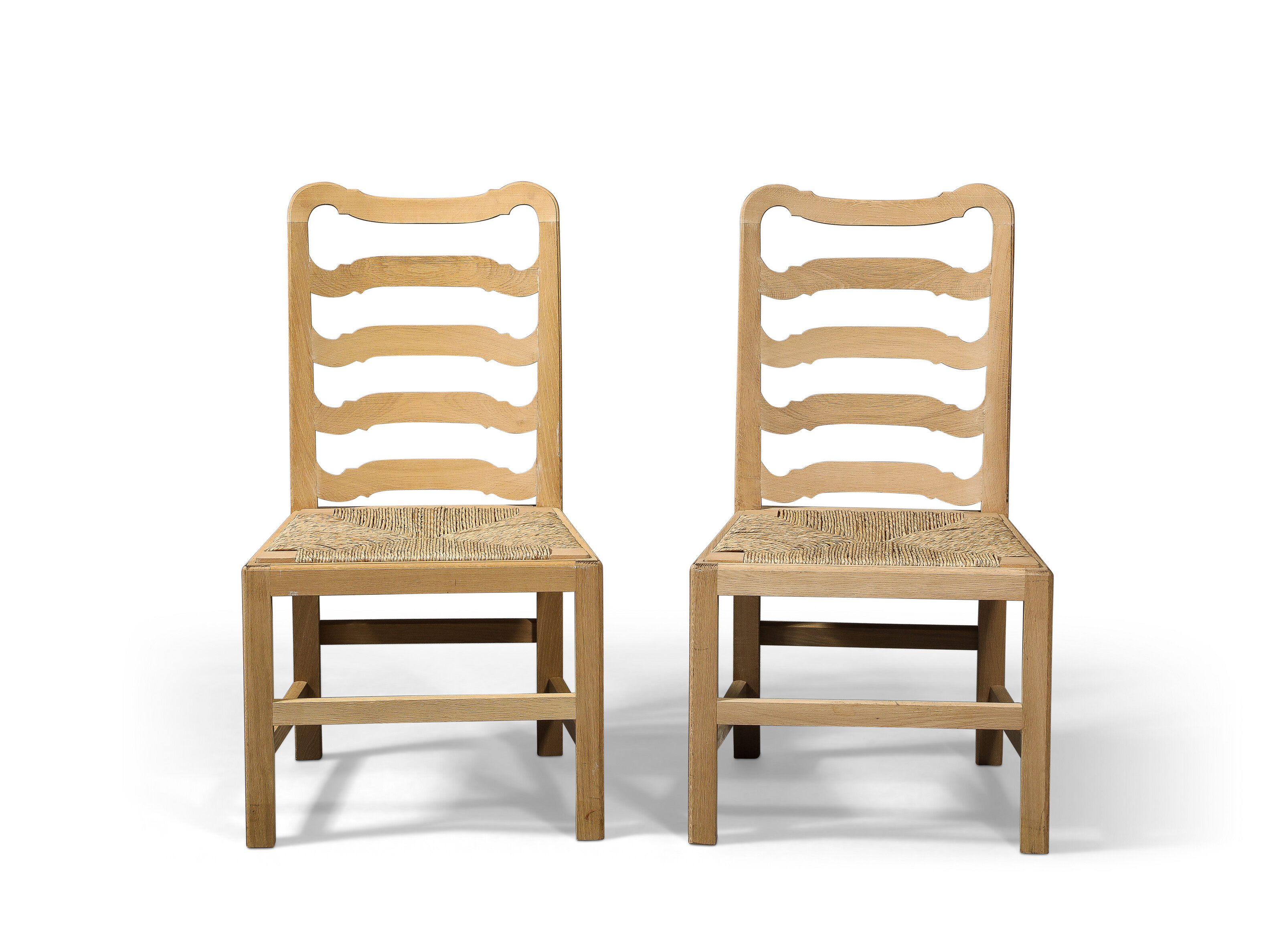 A PAIR OF RED OAK LADDER BACK SIDE CHAIRS, MANUFACTURED BY BURDEN, LLC ...