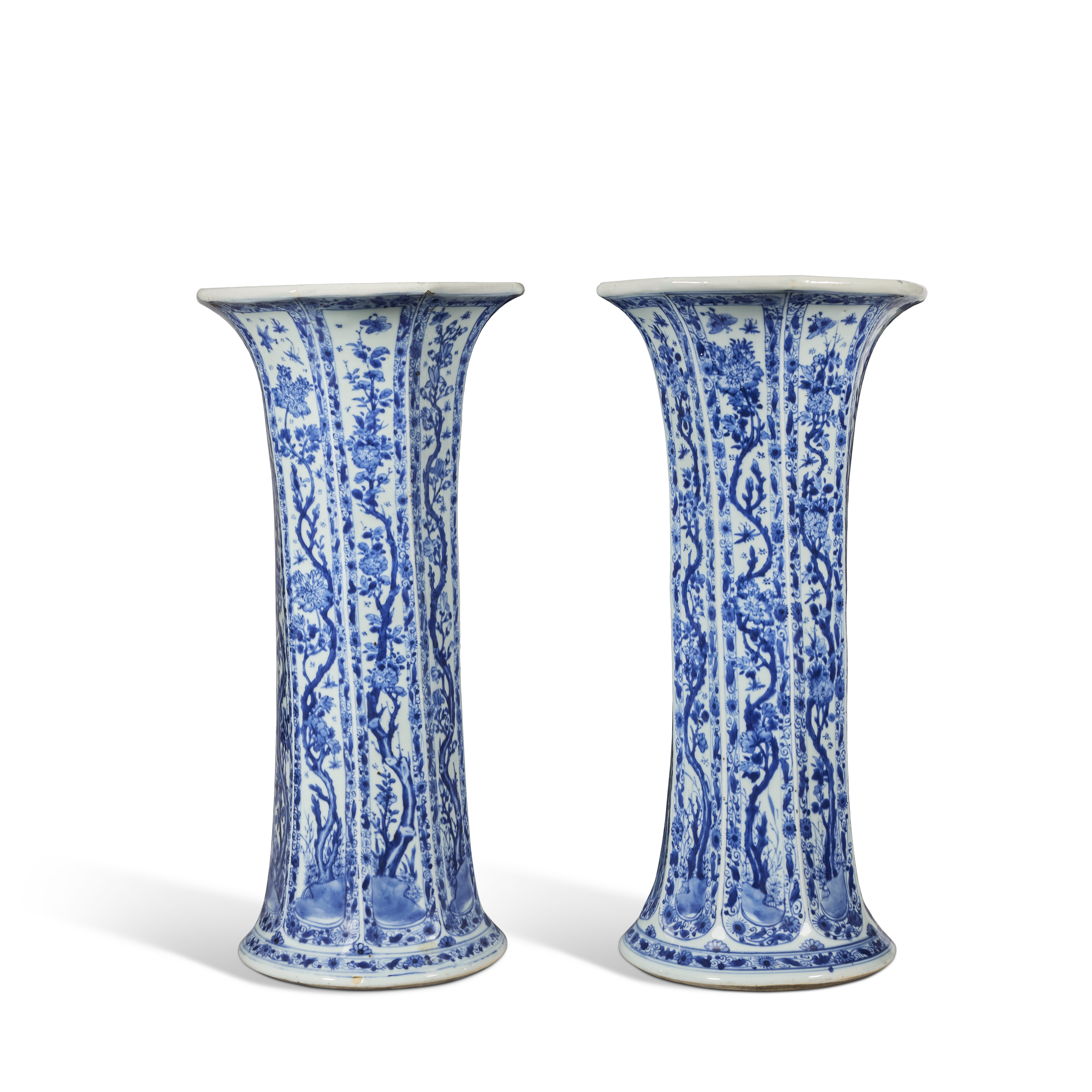 A PAIR OF BLUE AND WHITE 'FLORAL' VASES, GU, CHINA, QING DYNASTY ...